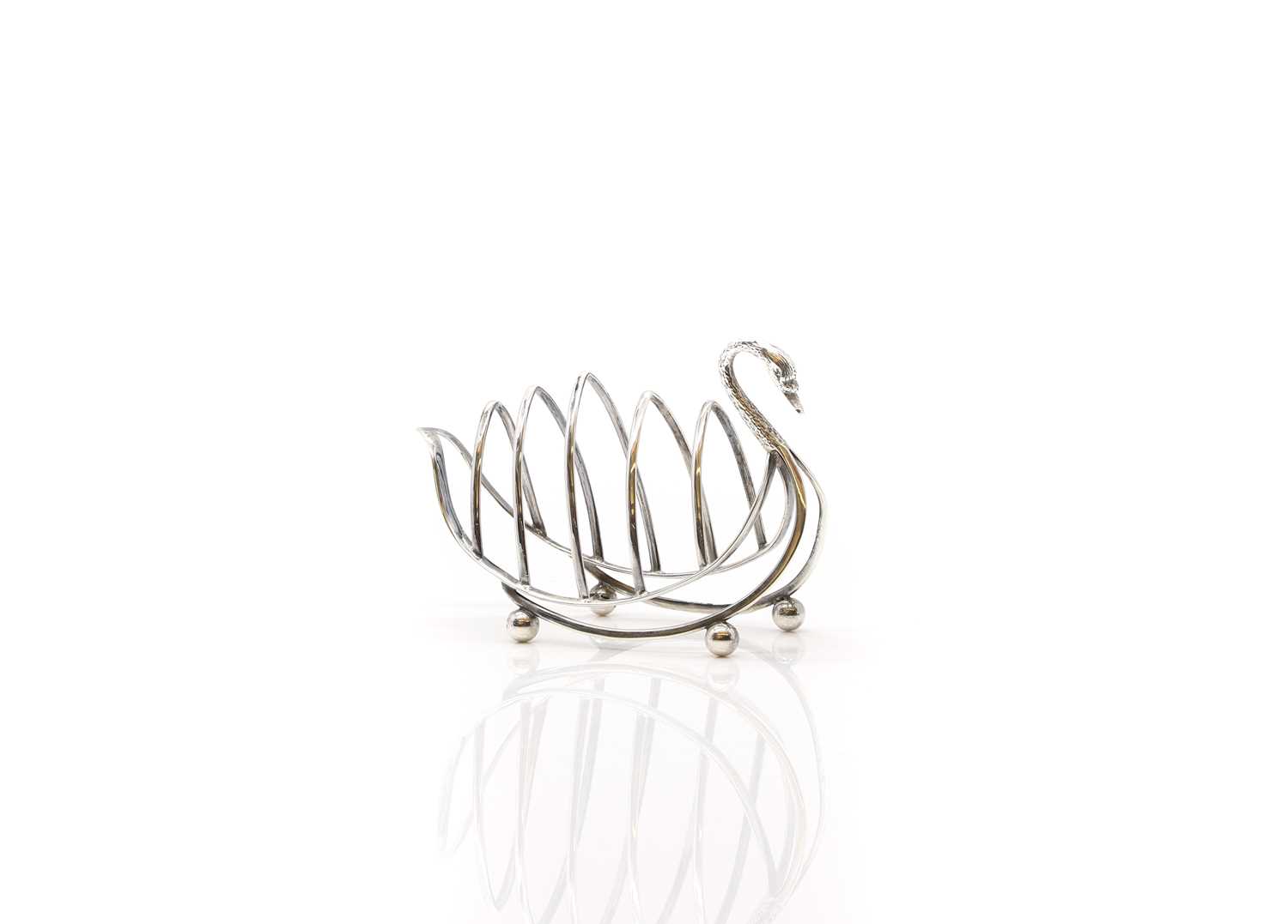 Lot 13 - A novelty silver toast rack