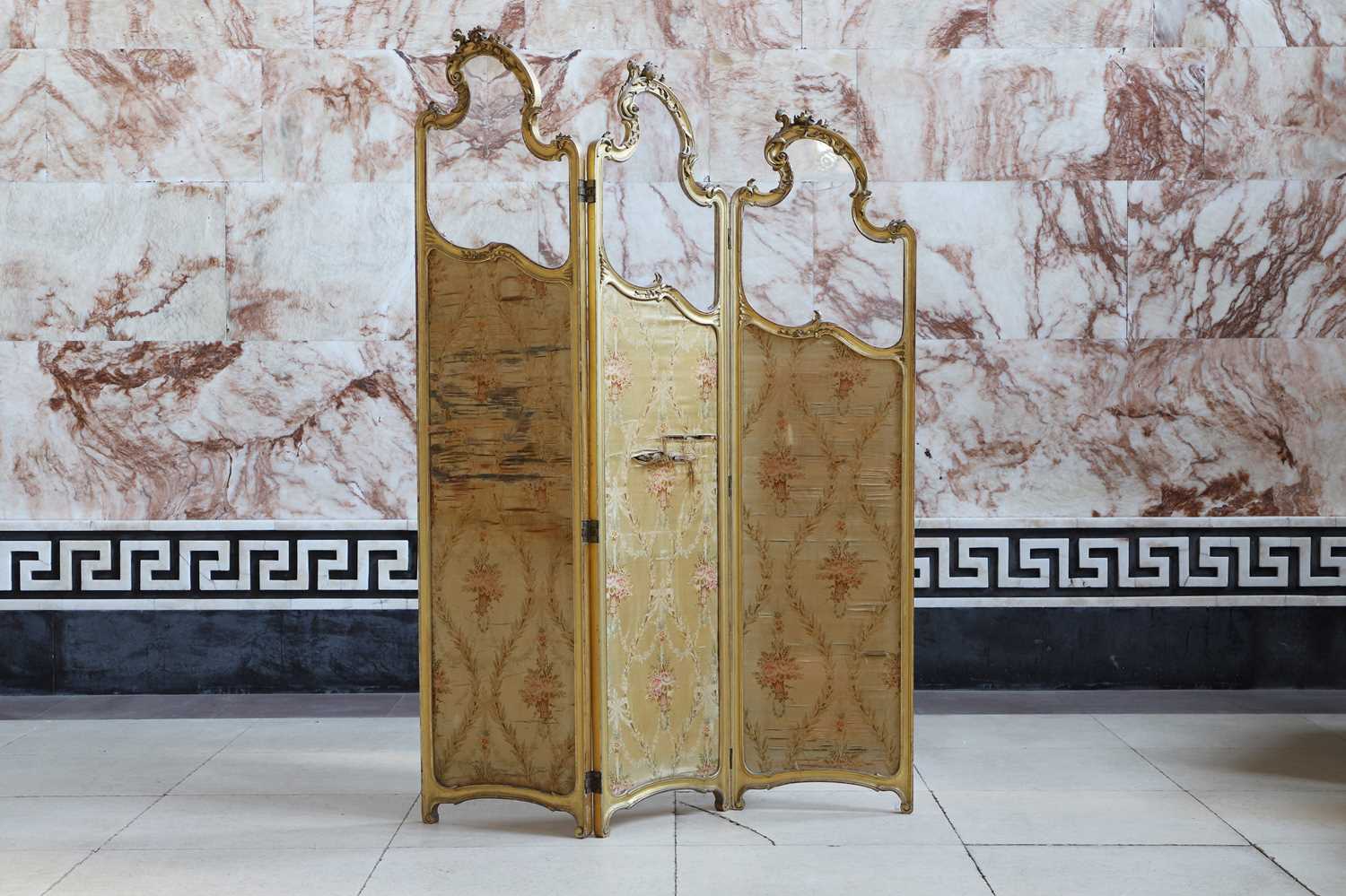 Lot 205 - A giltwood three-fold dressing screen,