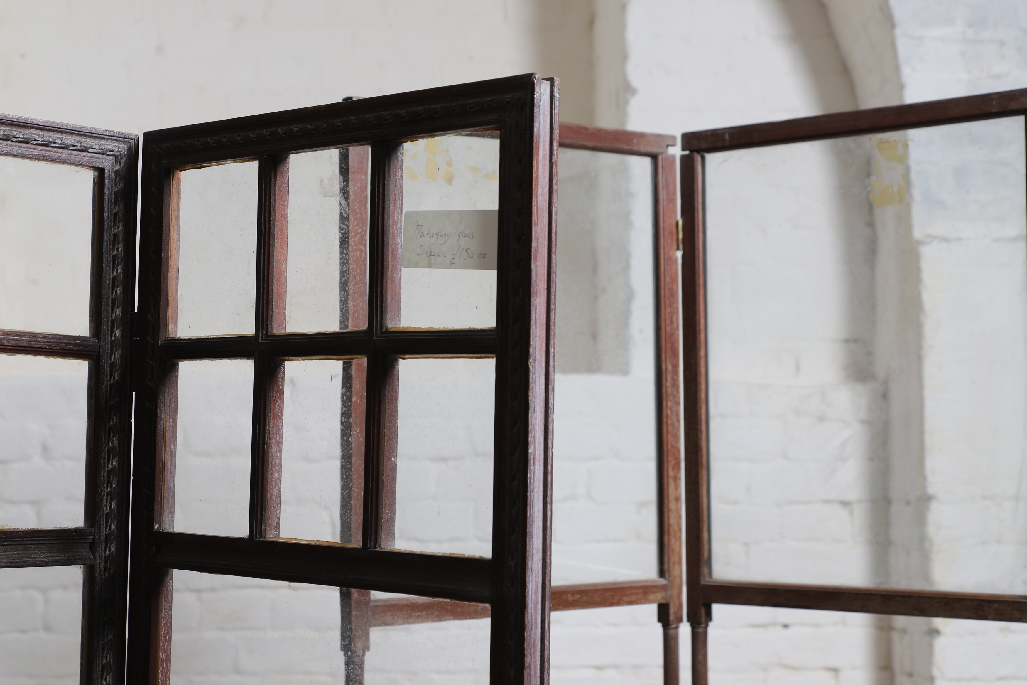 Lot 400 - Three mahogany and glazed screens,