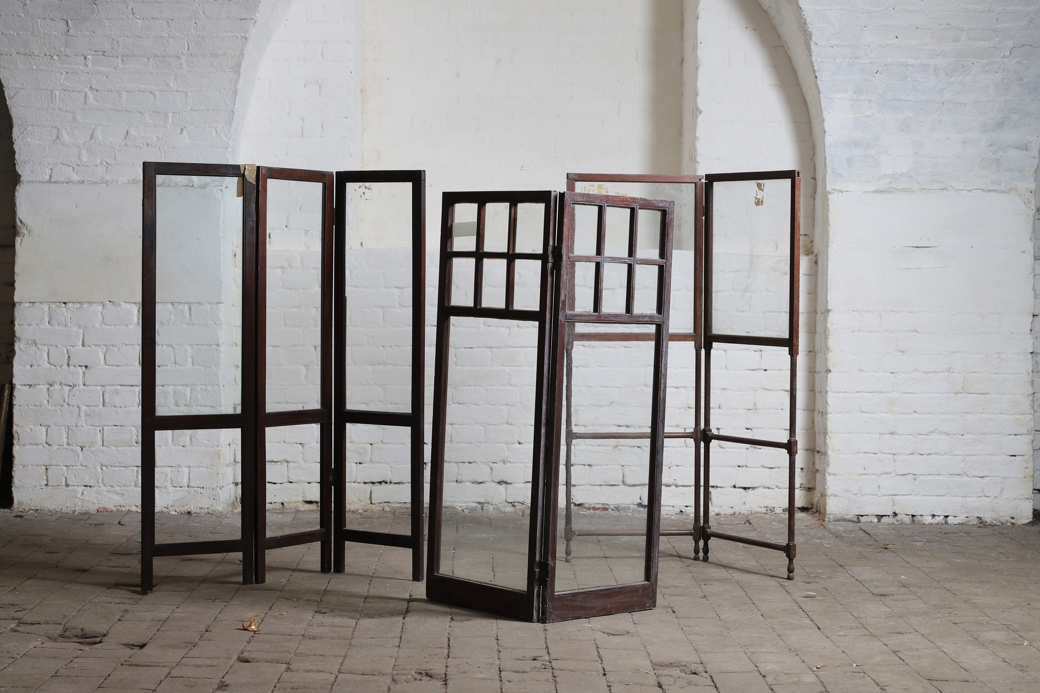Lot 400 - Three mahogany and glazed screens,