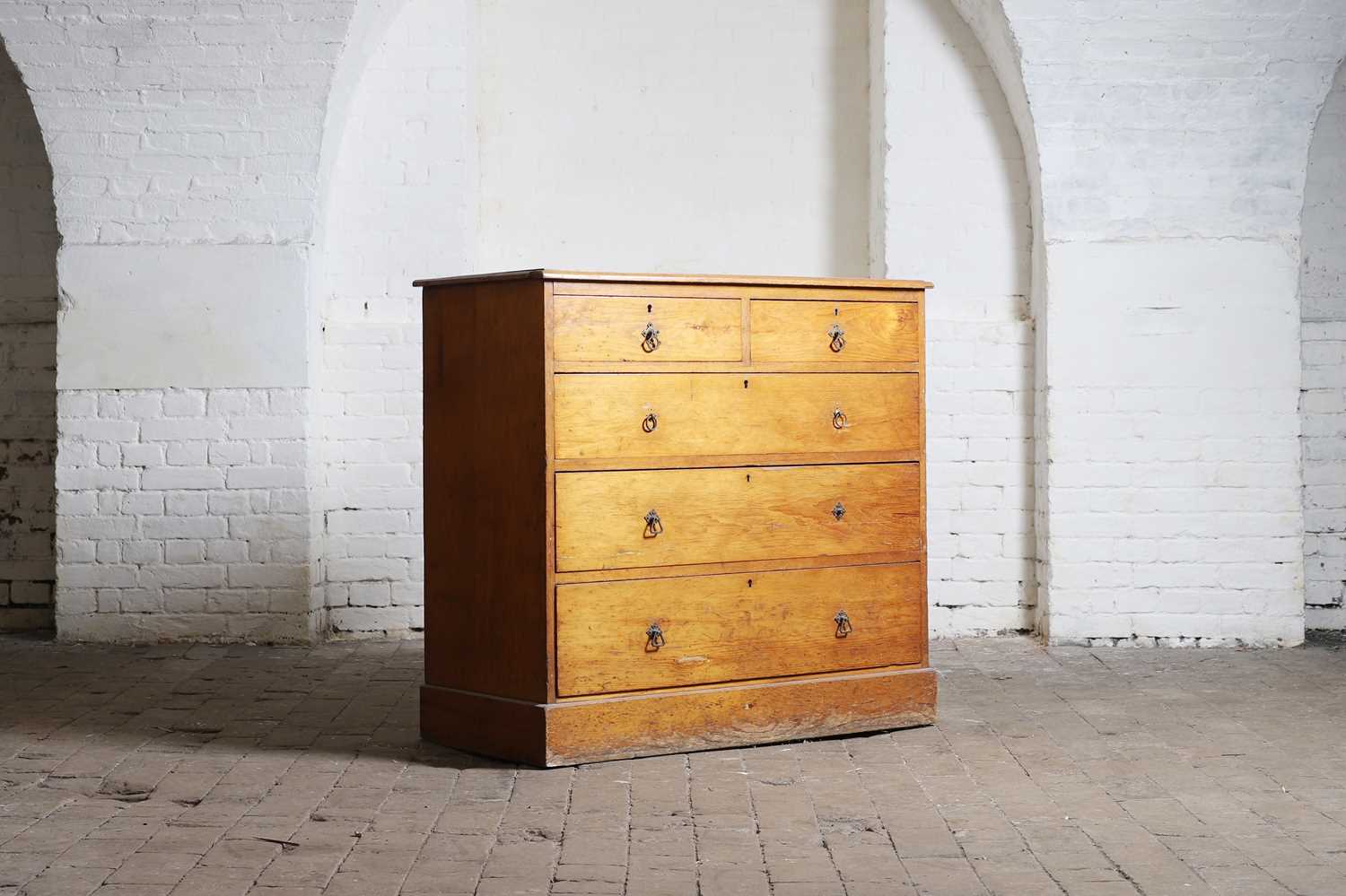 Lot 405 - An ash chest of drawers,
