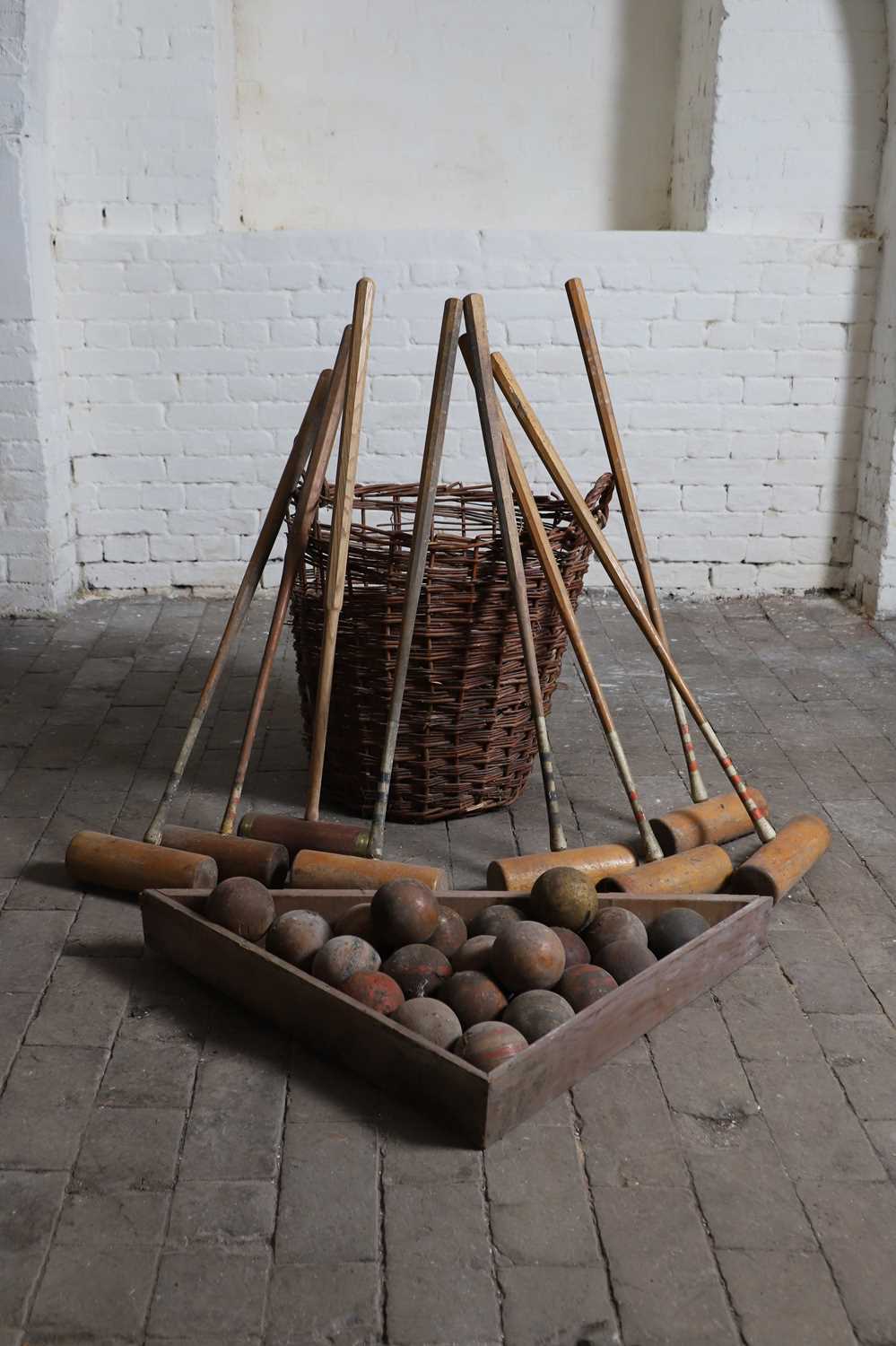 Lot 398 - A group of eight croquet mallets,