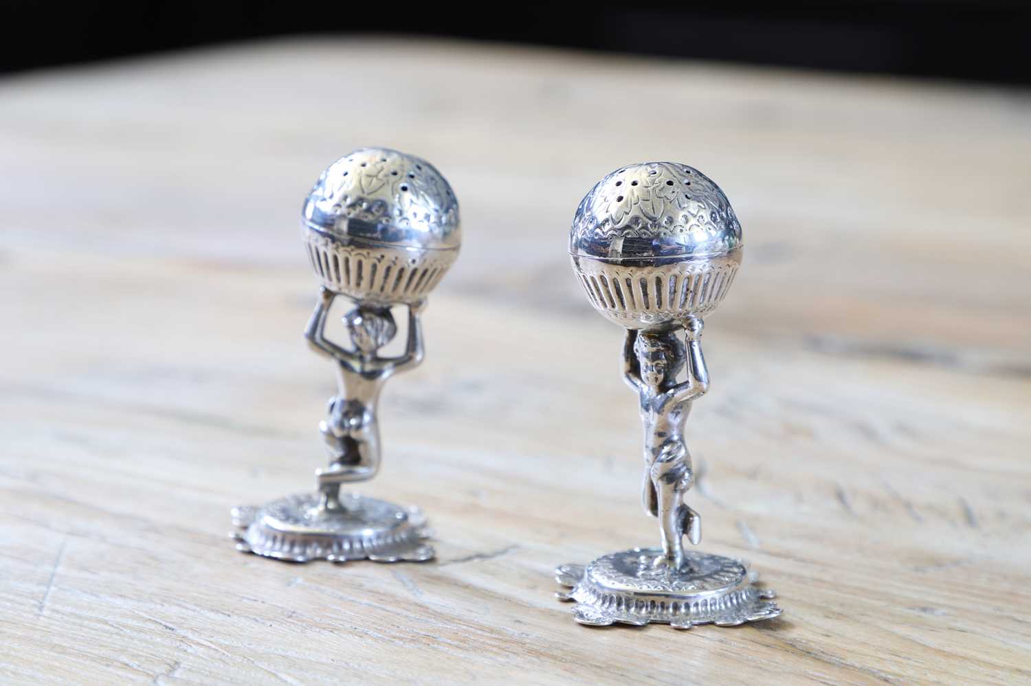 Lot 230 - A pair of Victorian silver pepperettes,