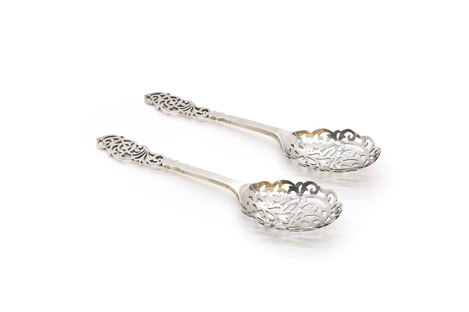 Lot 3 - A pair of silver filigree serving spoons,