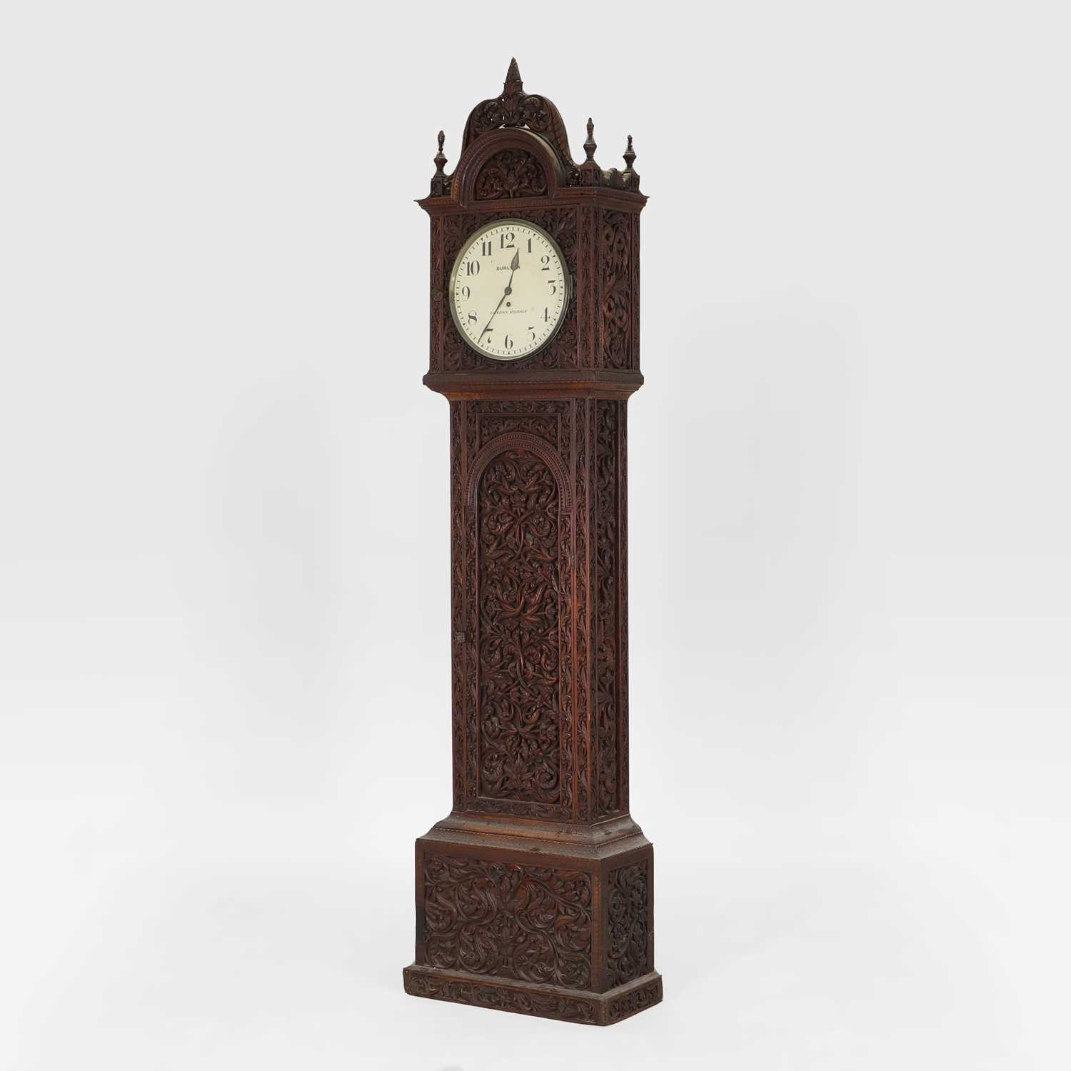 Lot 438 - A carved rosewood longcase clock,
