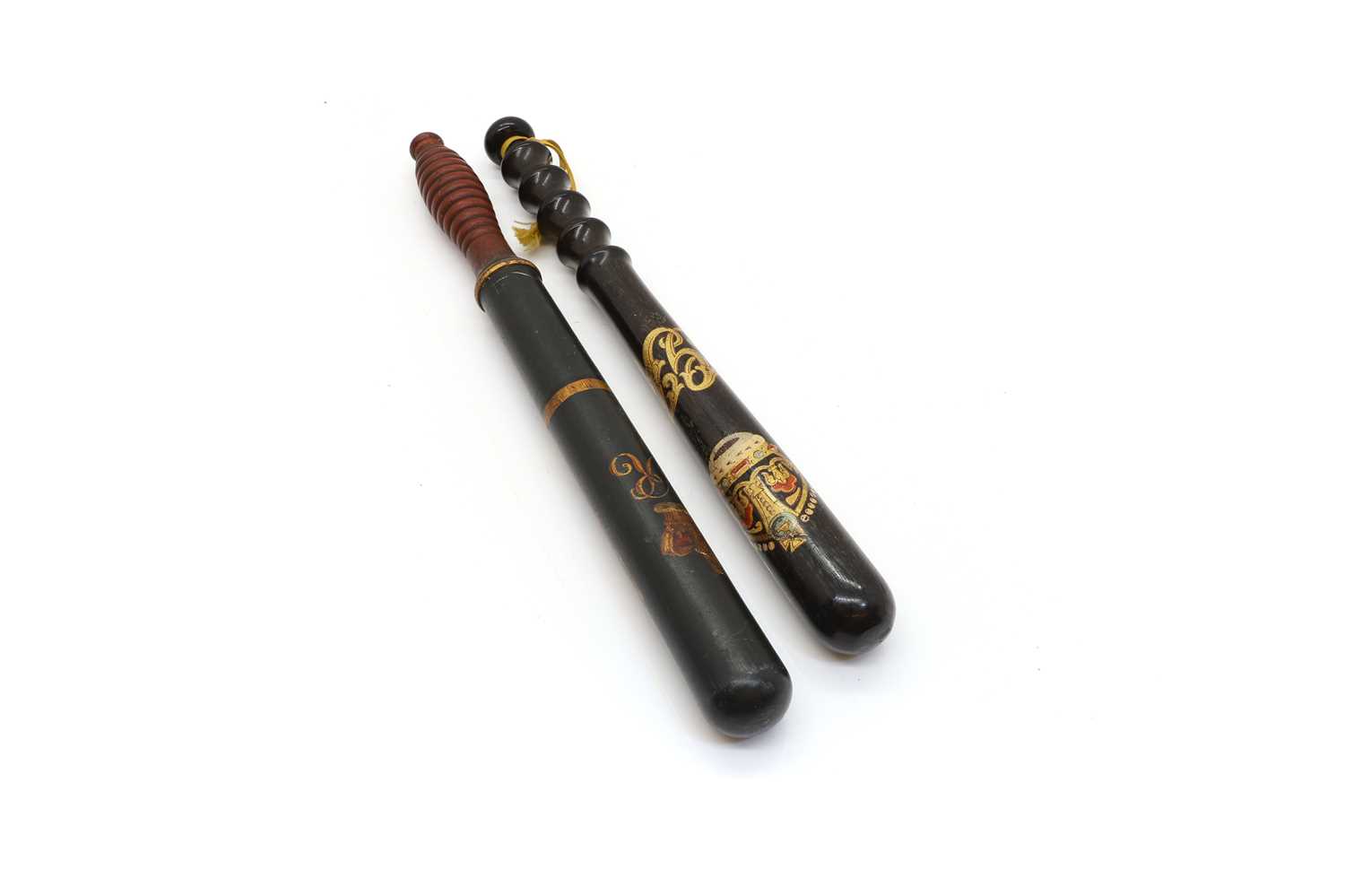 Lot 355 - Two painted wood truncheons,