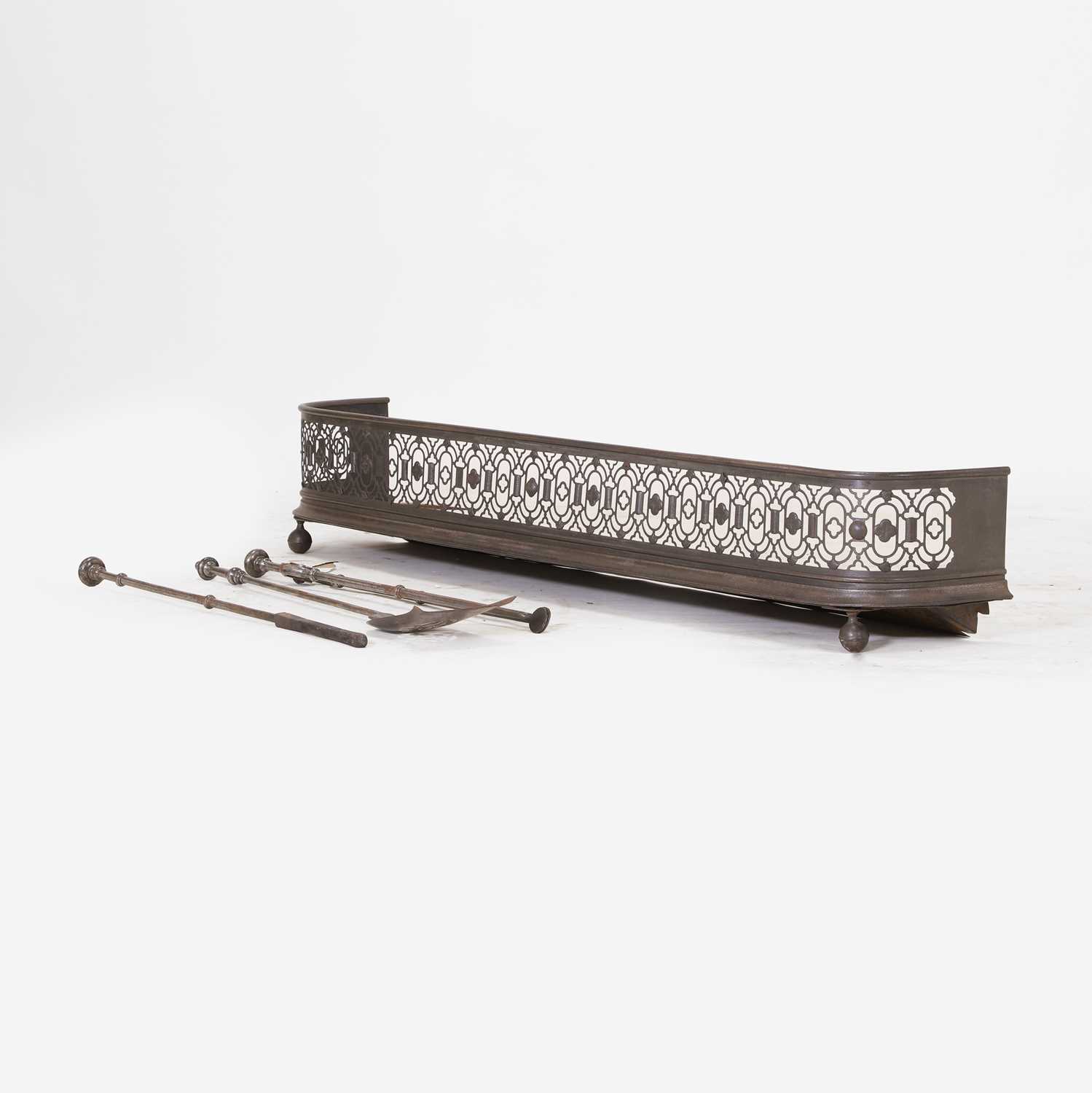 Lot 143 - A Regency polished steel fire kerb,