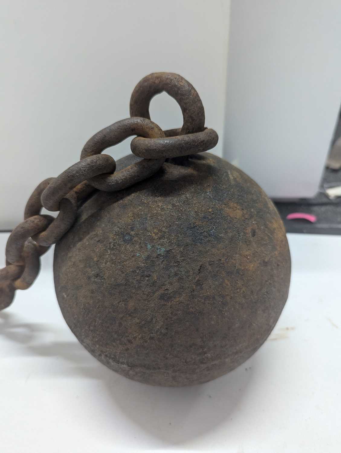 Lot 364 - A cast iron ball and chain,