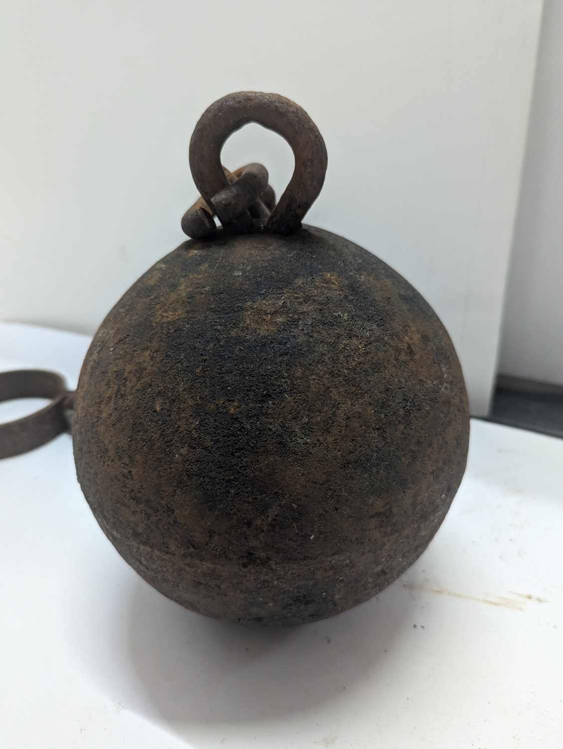 Lot 364 - A cast iron ball and chain,