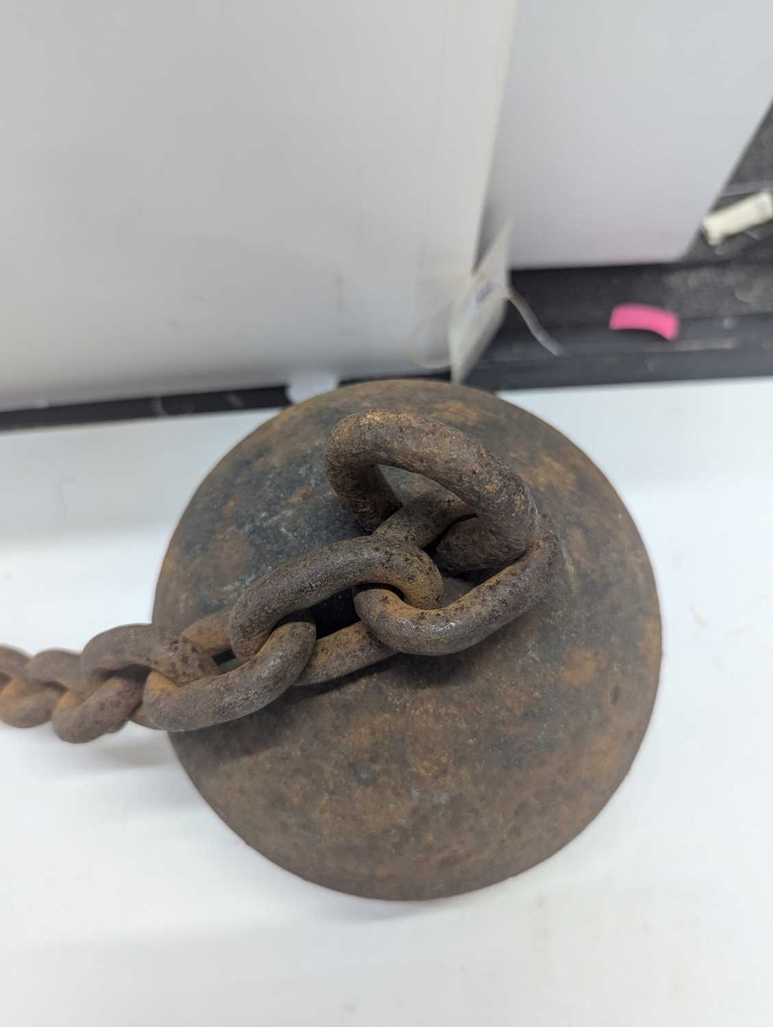 Lot 364 - A cast iron ball and chain,
