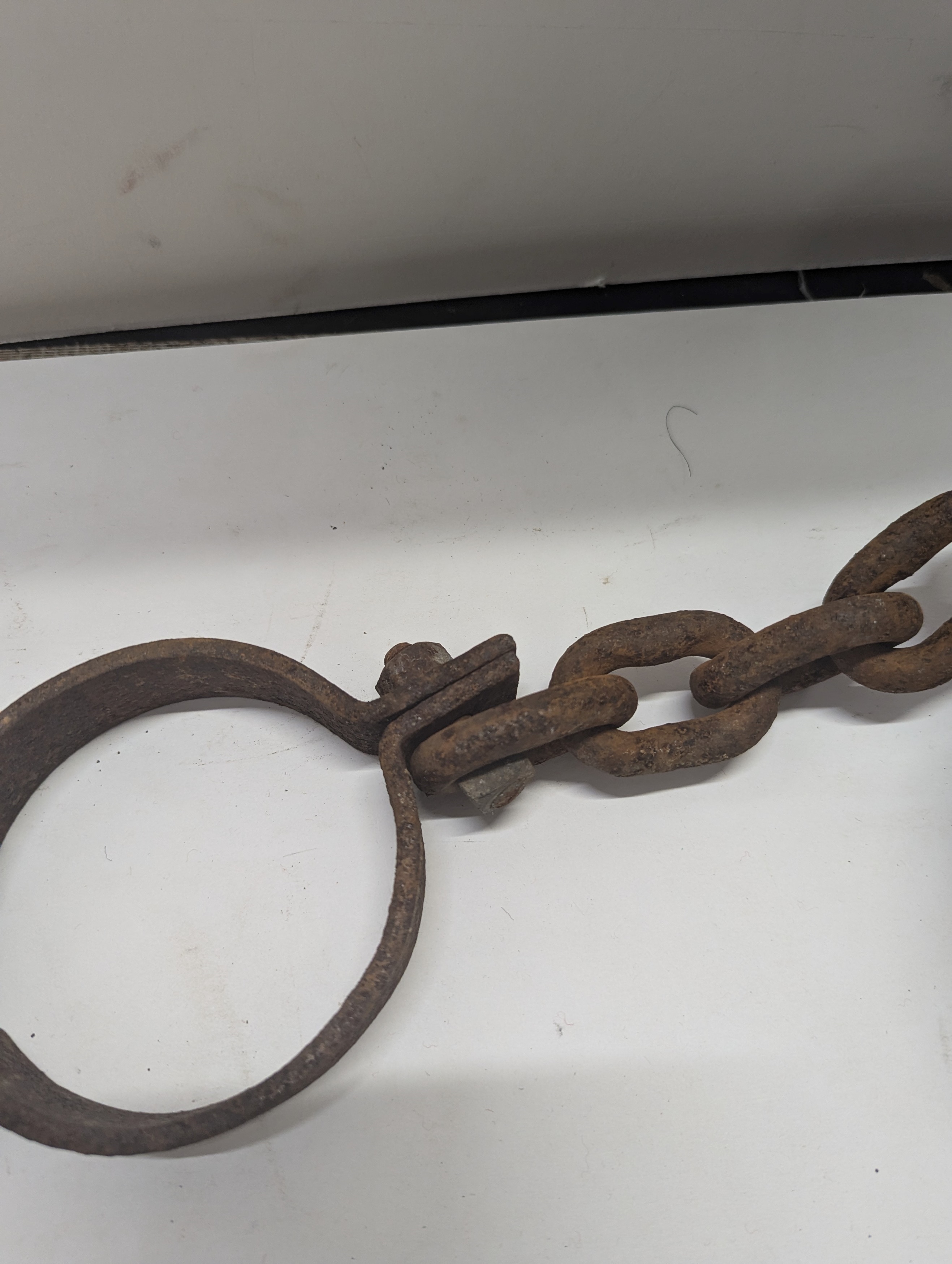 Lot 364 - A cast iron ball and chain,