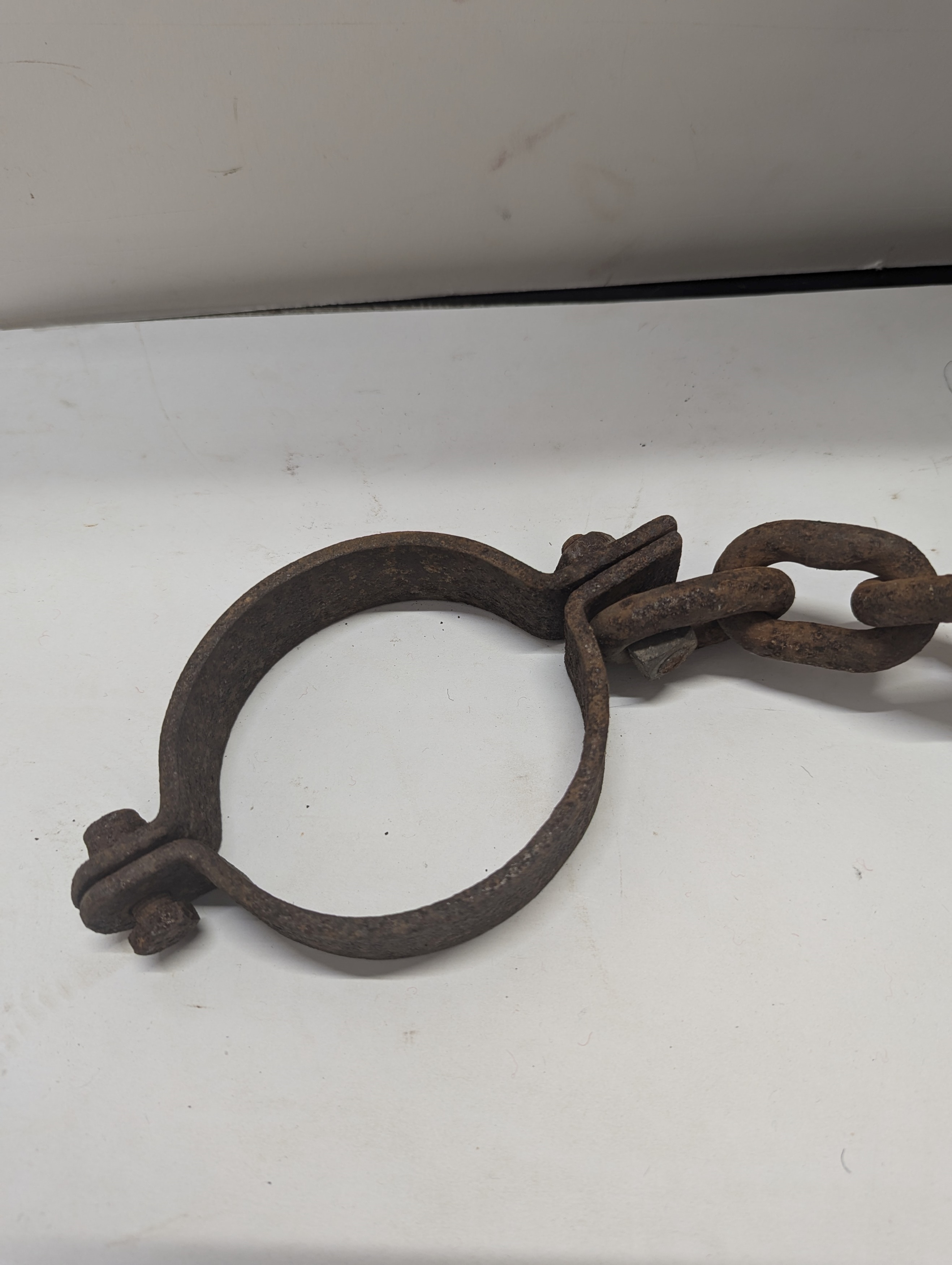 Lot 364 - A cast iron ball and chain,