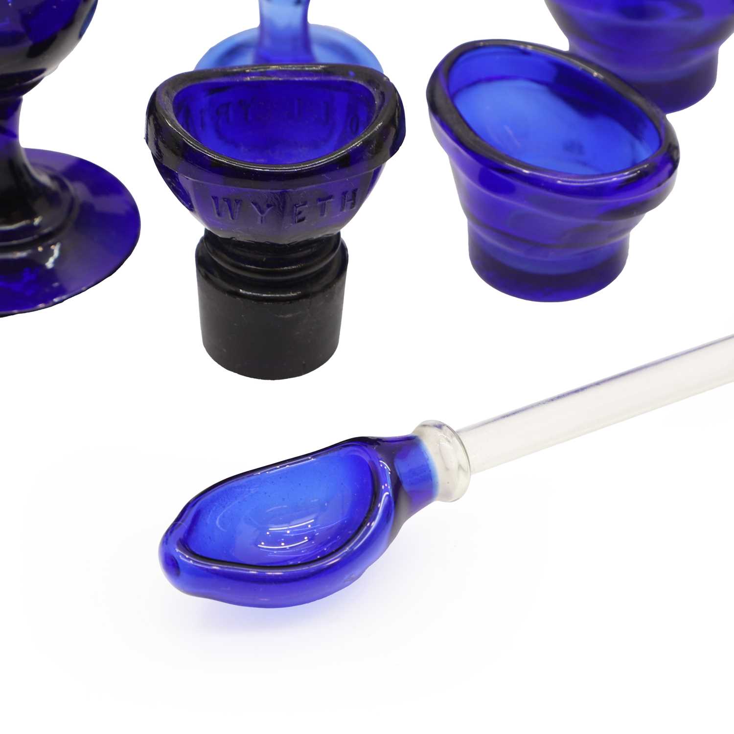 Lot 228 - A collection of glass eyebaths,