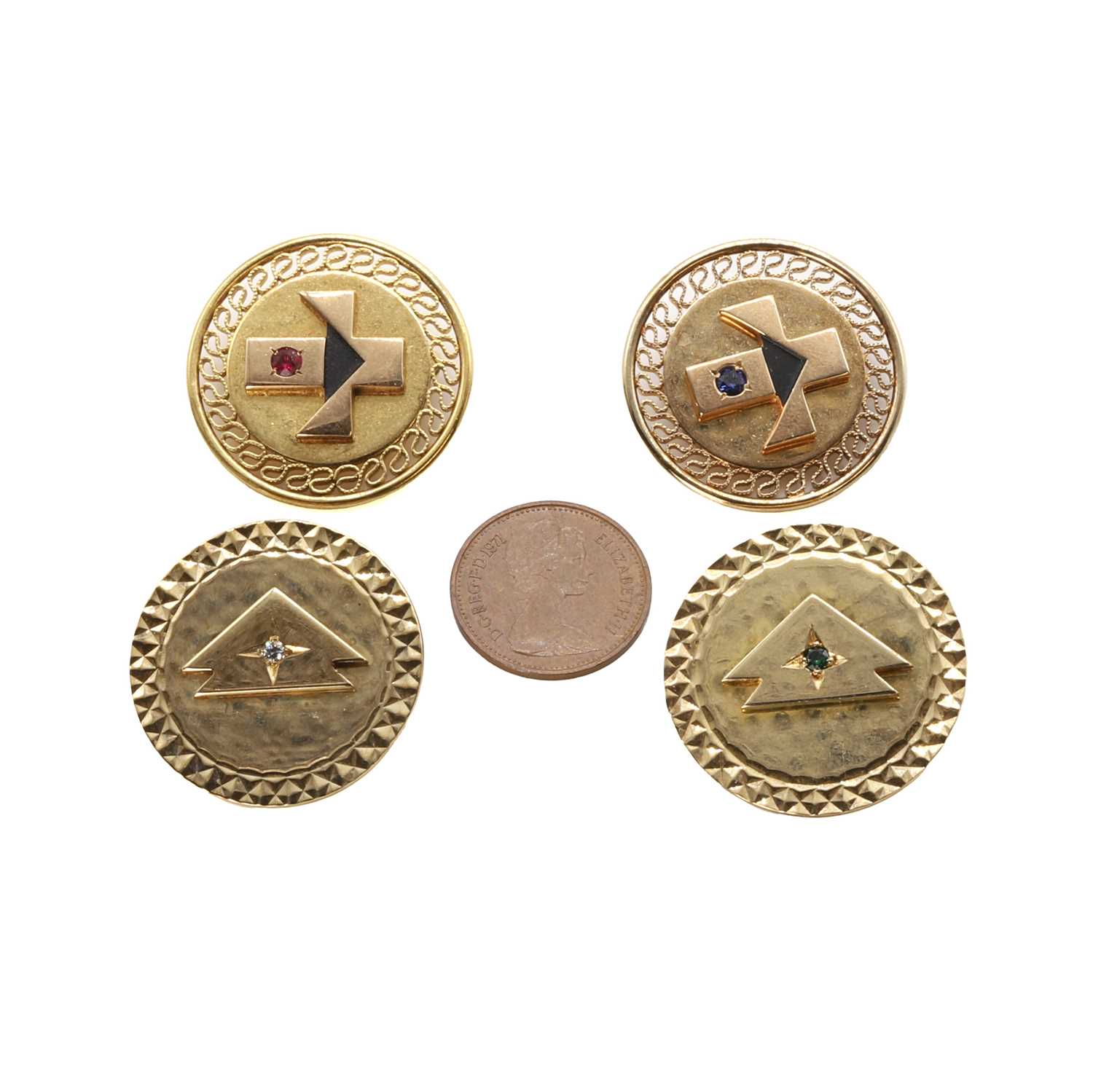 Lot 312 - A group of four badges,