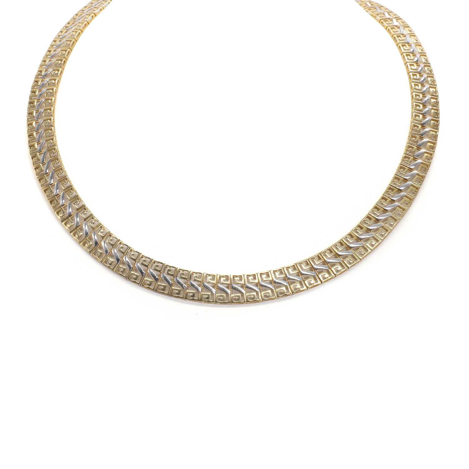 Lot 254 - A 9ct gold Greek key collar necklace,