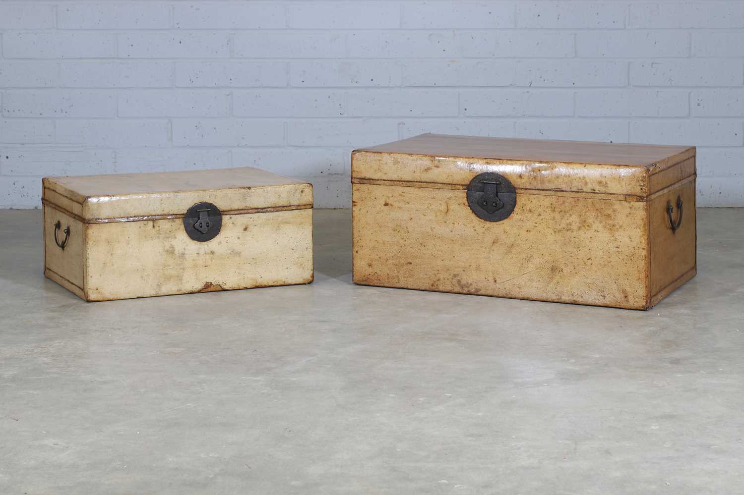 Lot 315 - Two vellum storage trunks,