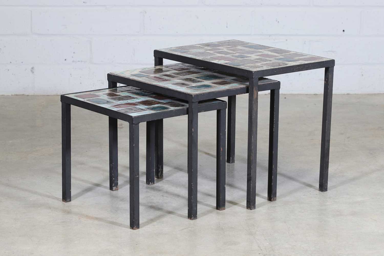 Lot 718 - A nest of three side tables,
