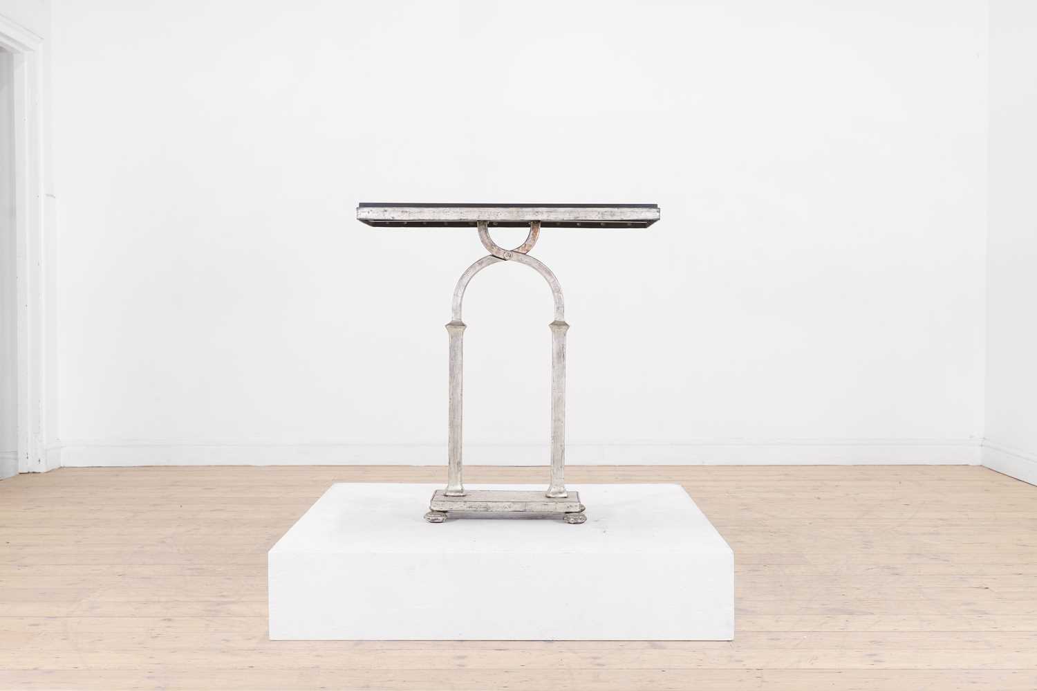 Lot 613 - A silvered steel 'Peristyle' console table