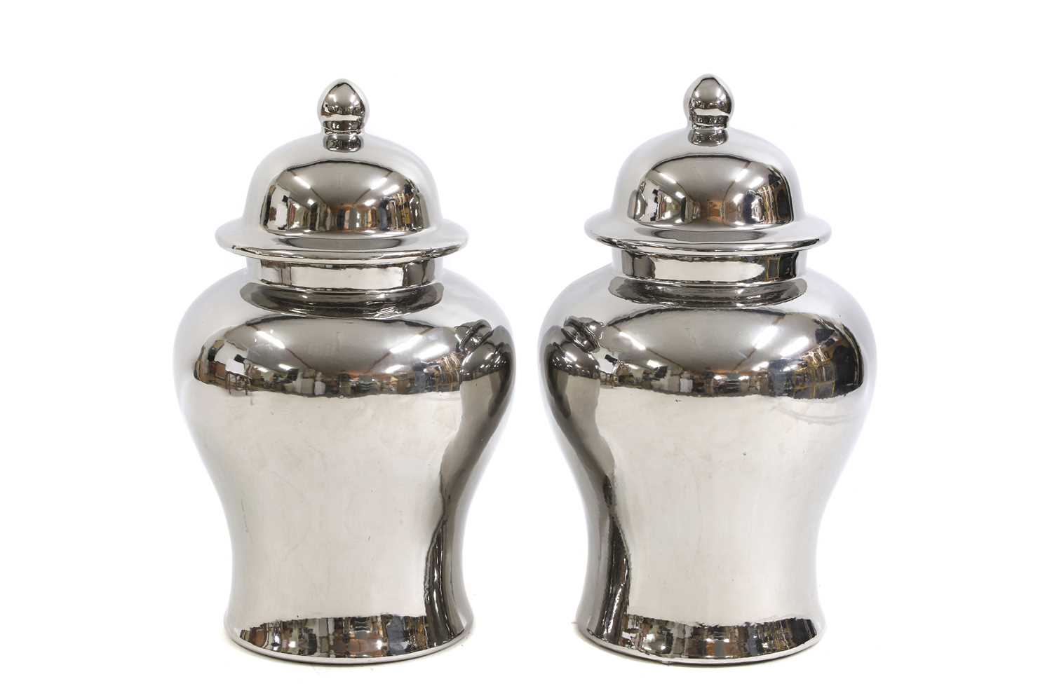 Lot 162 - A pair of temple jars and covers,