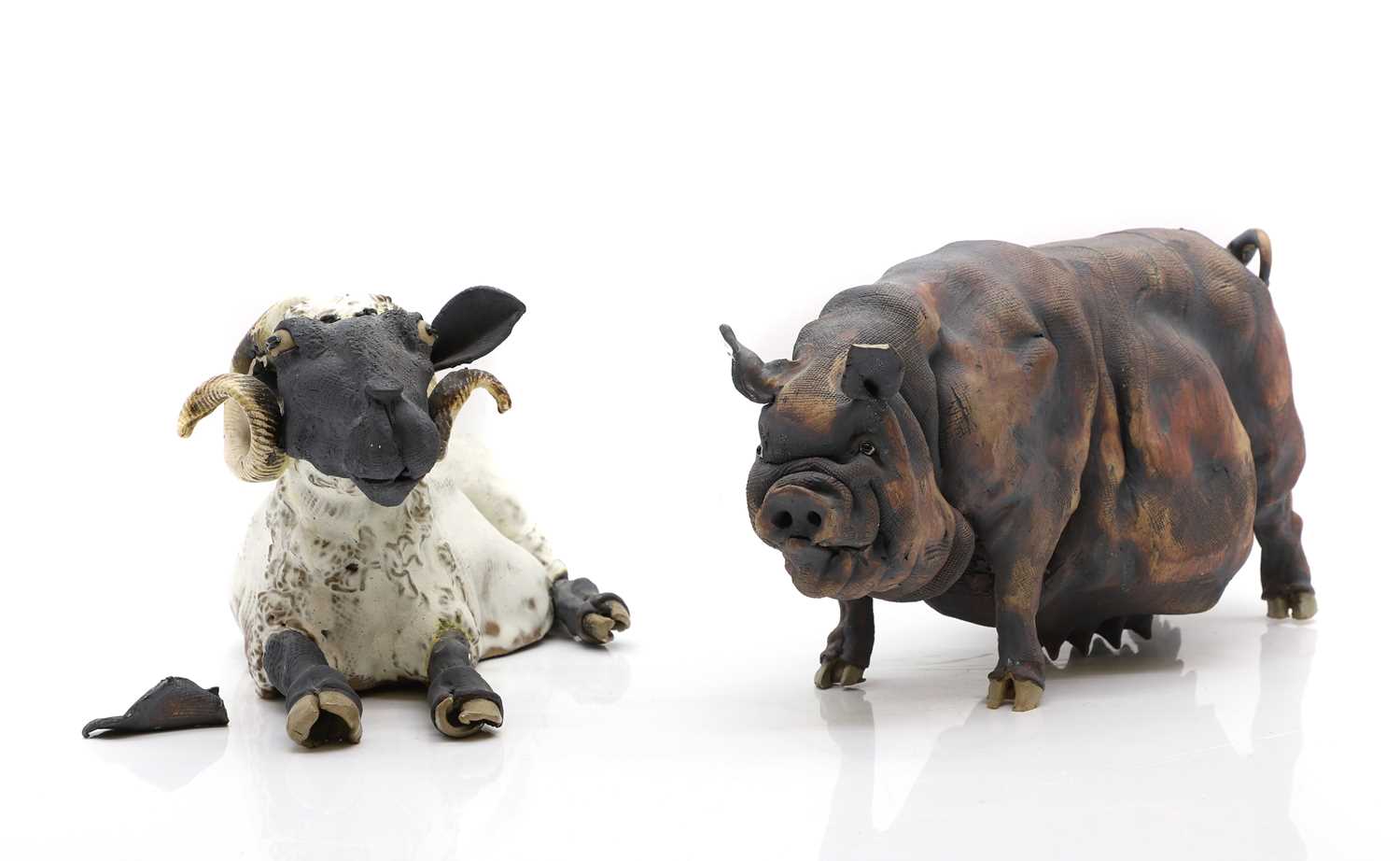 Lot 293 - Two studio pottery animal figures,