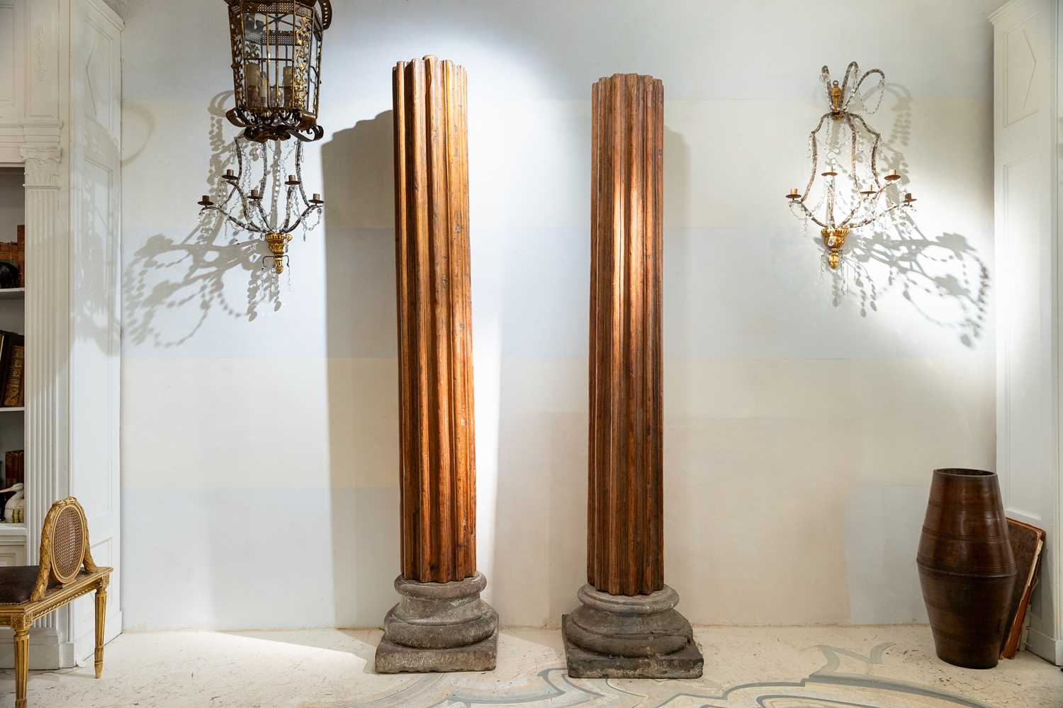 Lot 237 - A pair of fluted teak columns,