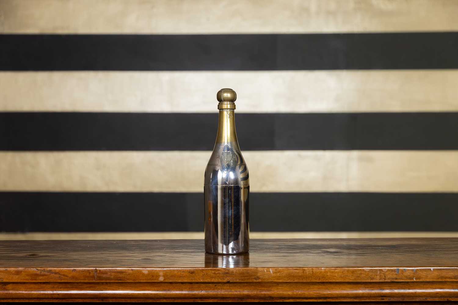 Lot 420 - A silver-plated cocktail shaker,