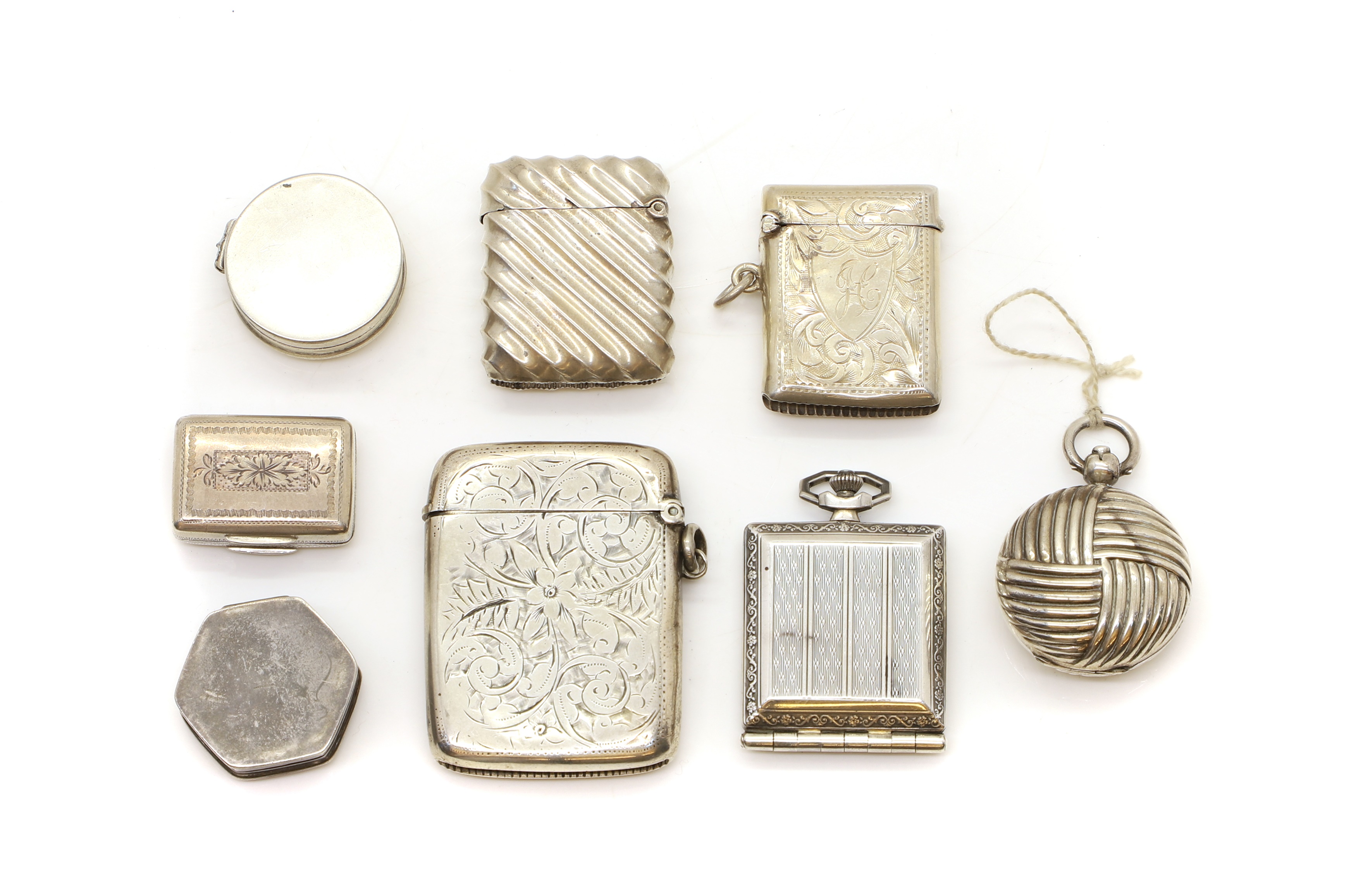 Lot 31 - A collection of silver vesta and pill boxes,