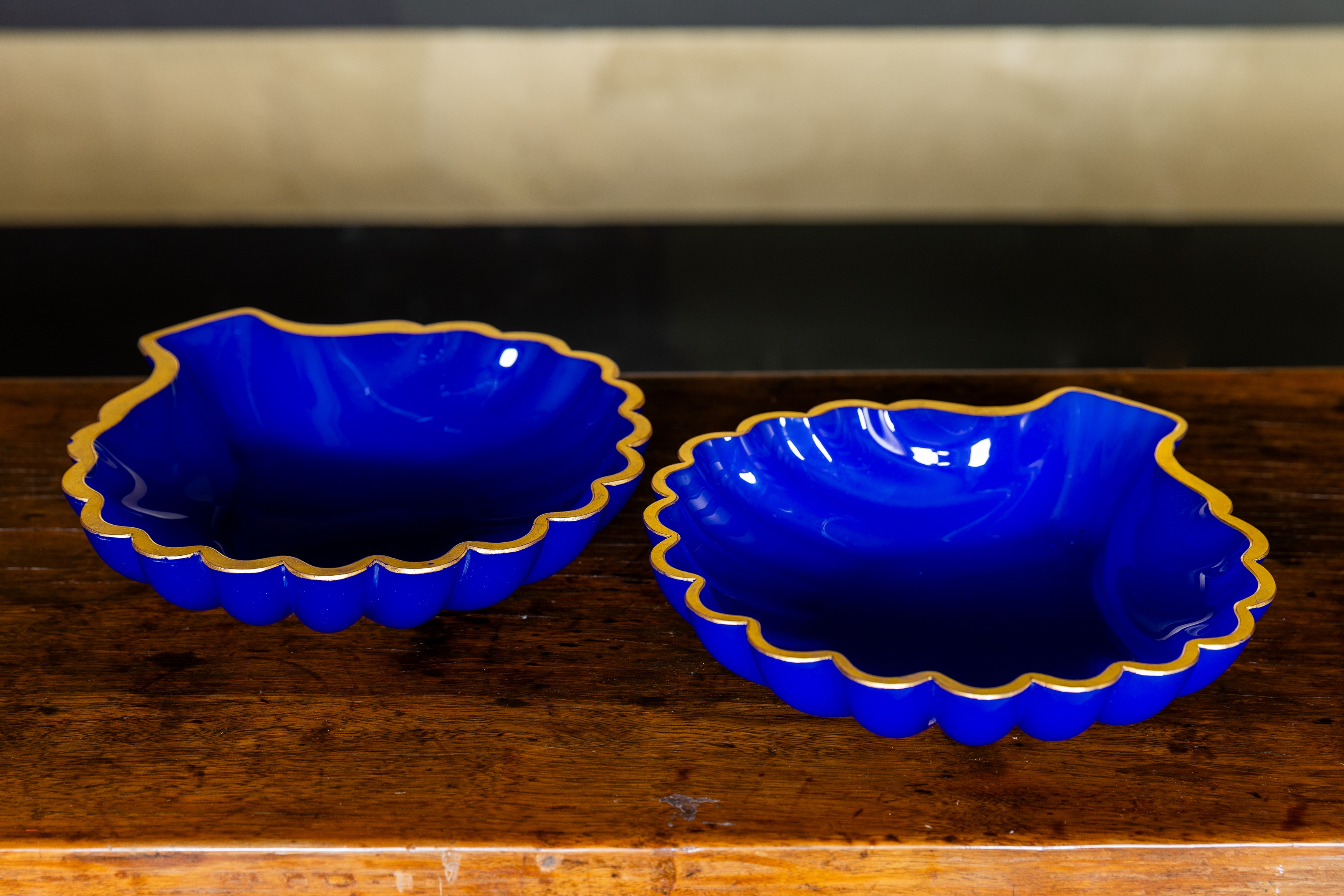 Lot 199 - A set of twelve blue Murano glass shell