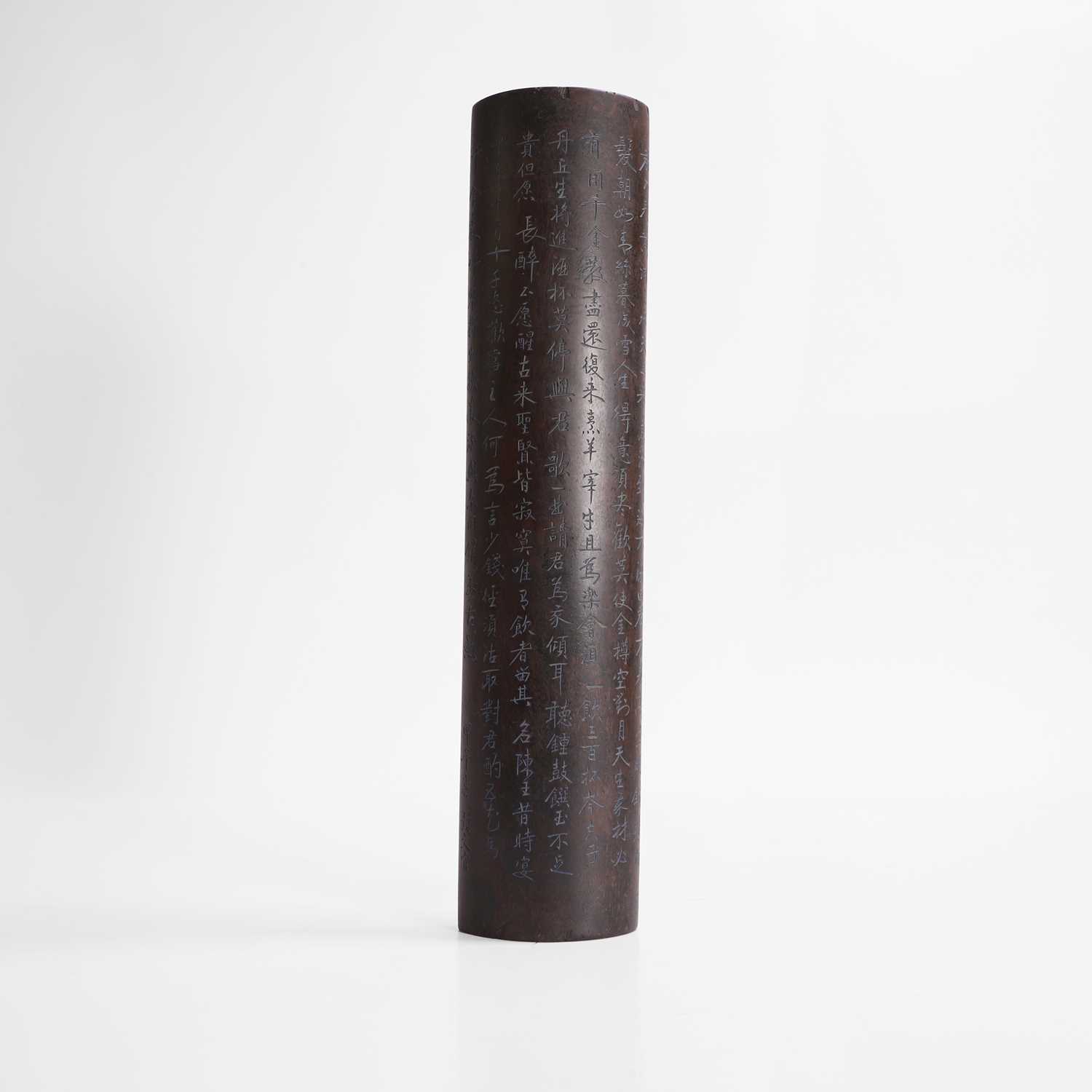 Lot 512 - A Chinese wood wrist rest,