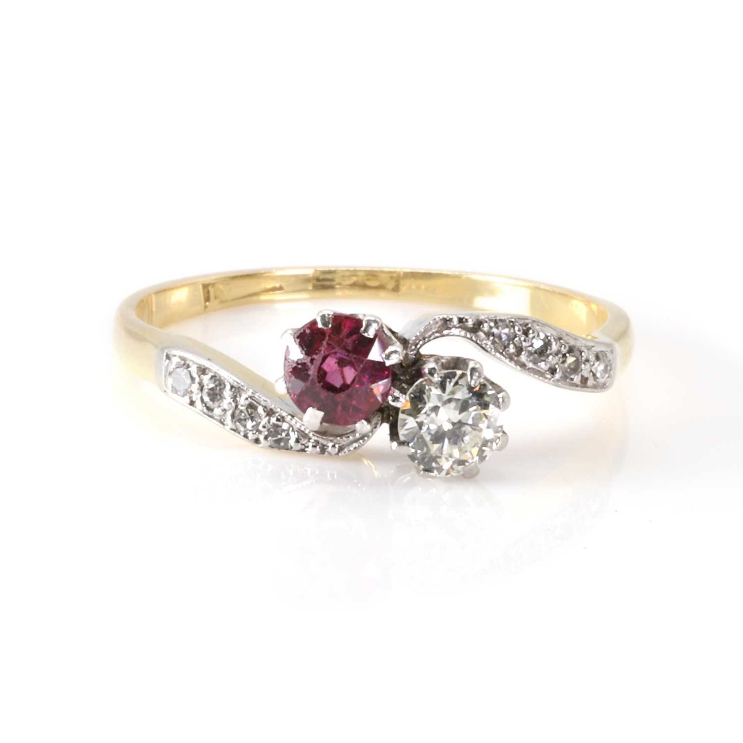 Lot 60 - A ruby and diamond Toi et Moi ring,