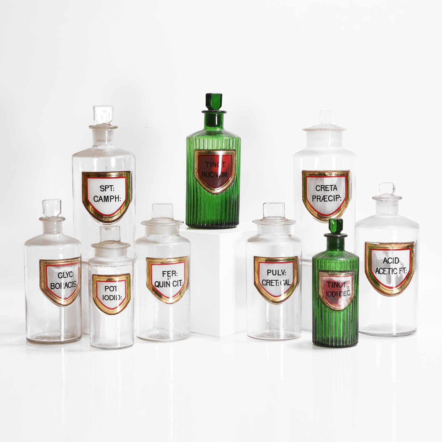 Lot 452 - Seven clear glass medicine bottles and