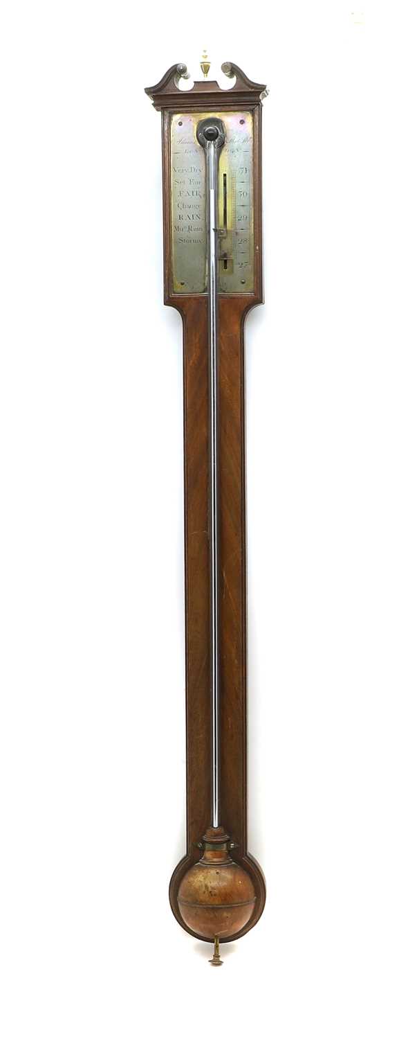 Lot 470 - A George III mahogany stick barometer,