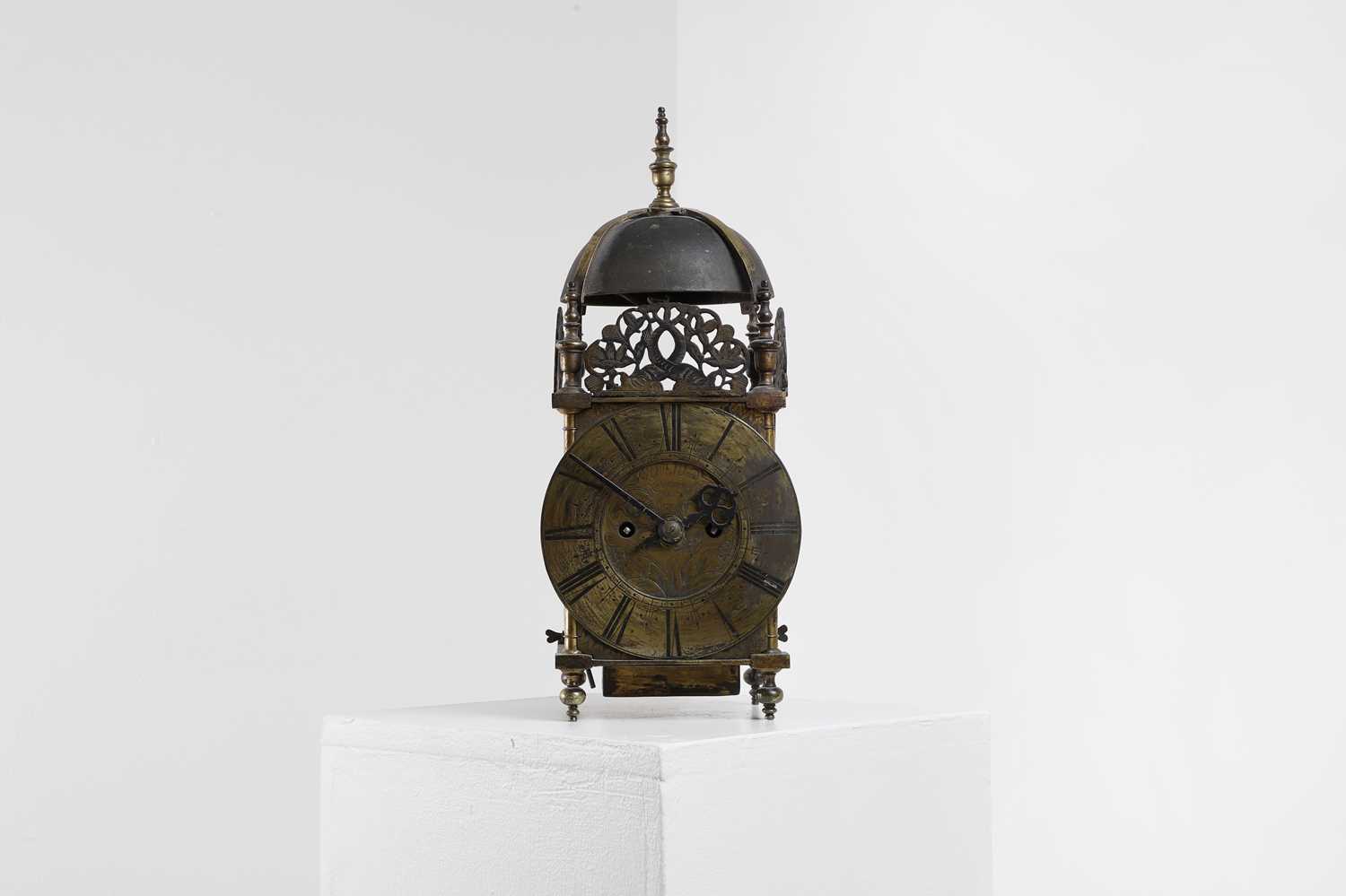 Lot 437 - A Queen Anne brass lantern clock by William