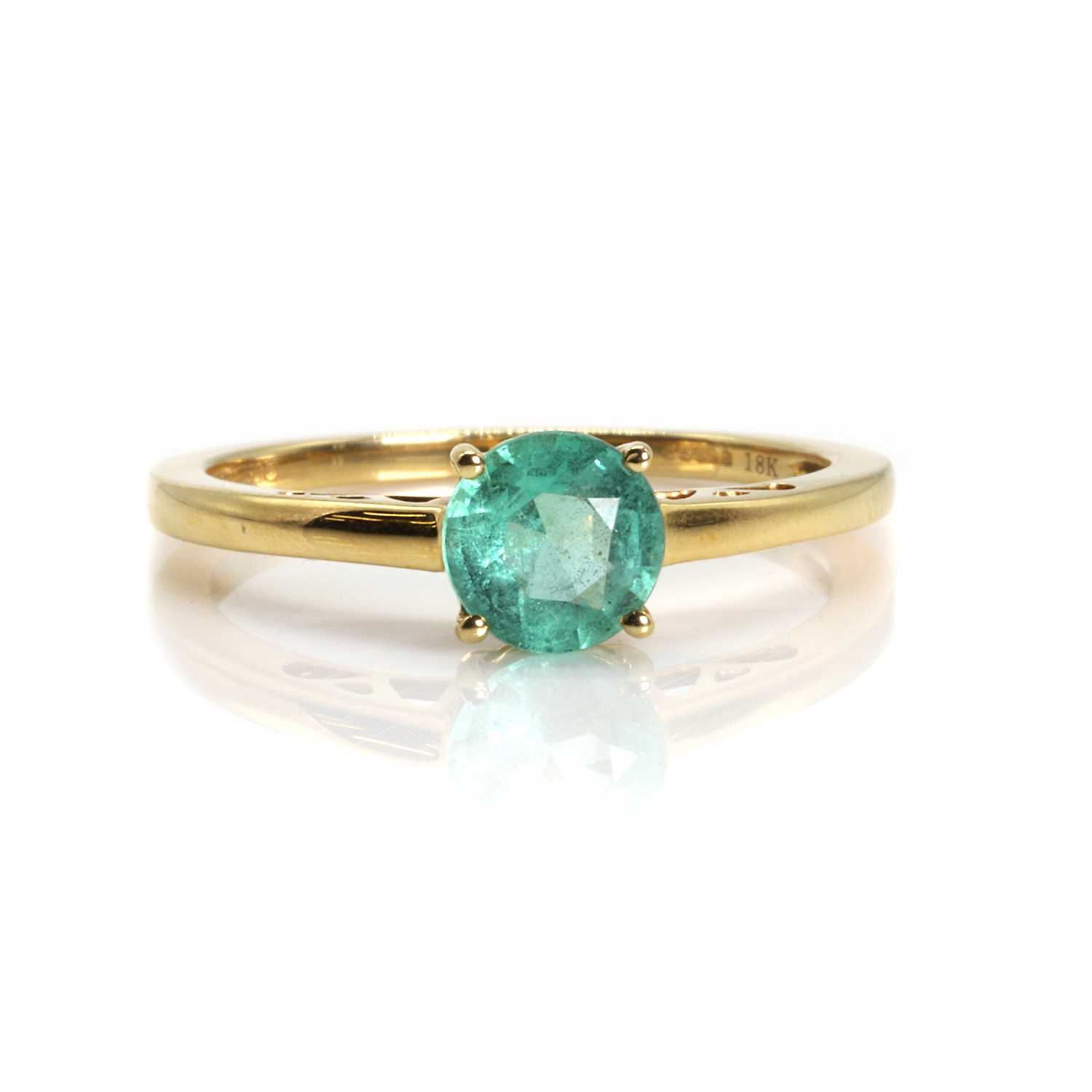 Lot 150 - An 18ct gold emerald single stone ring,