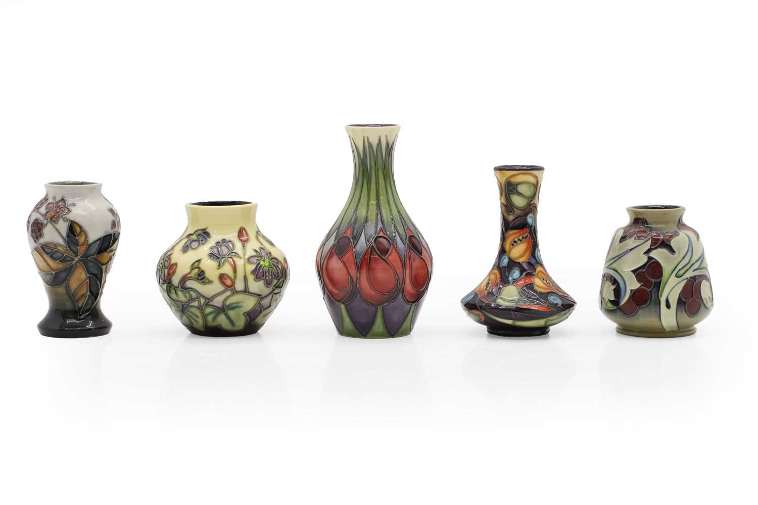 Lot 164 - A group of five Moorcroft pottery vases,