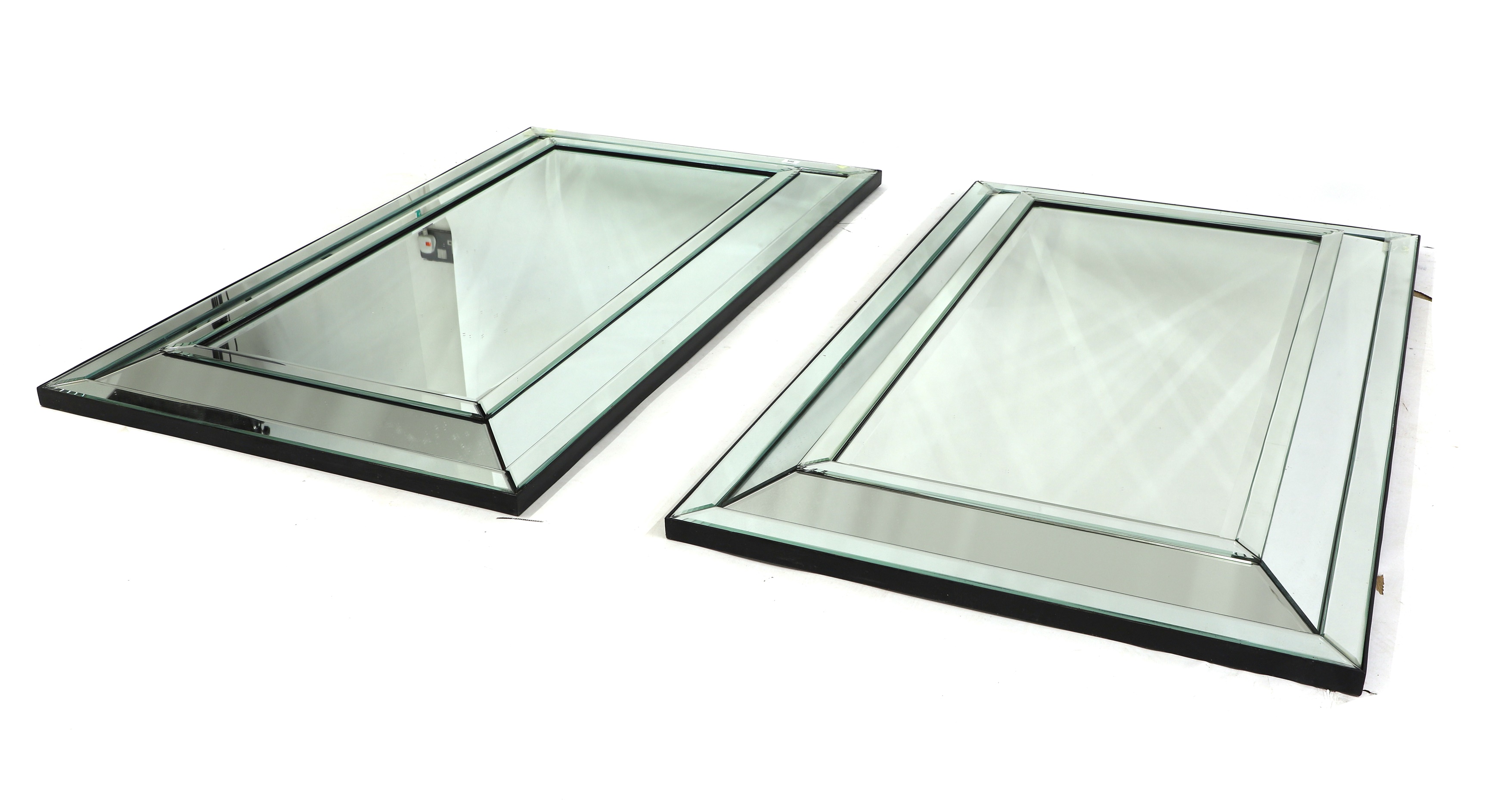 Lot 425 - A pair of rectangular wall mirrors,