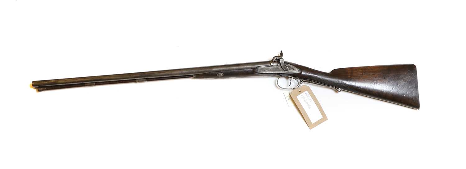 Lot 127 - A double barrel muzzle loading shotgun,