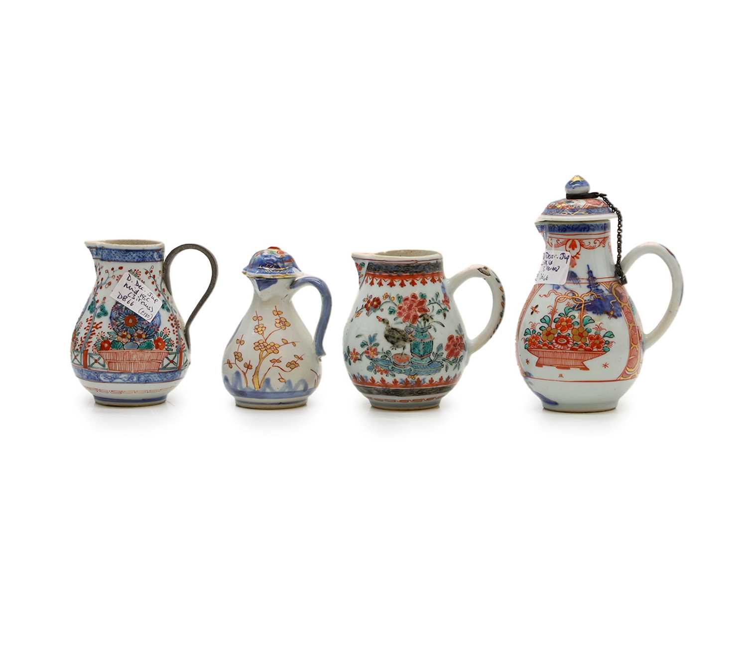Lot 257 - A collection of Chinese export milk jugs,