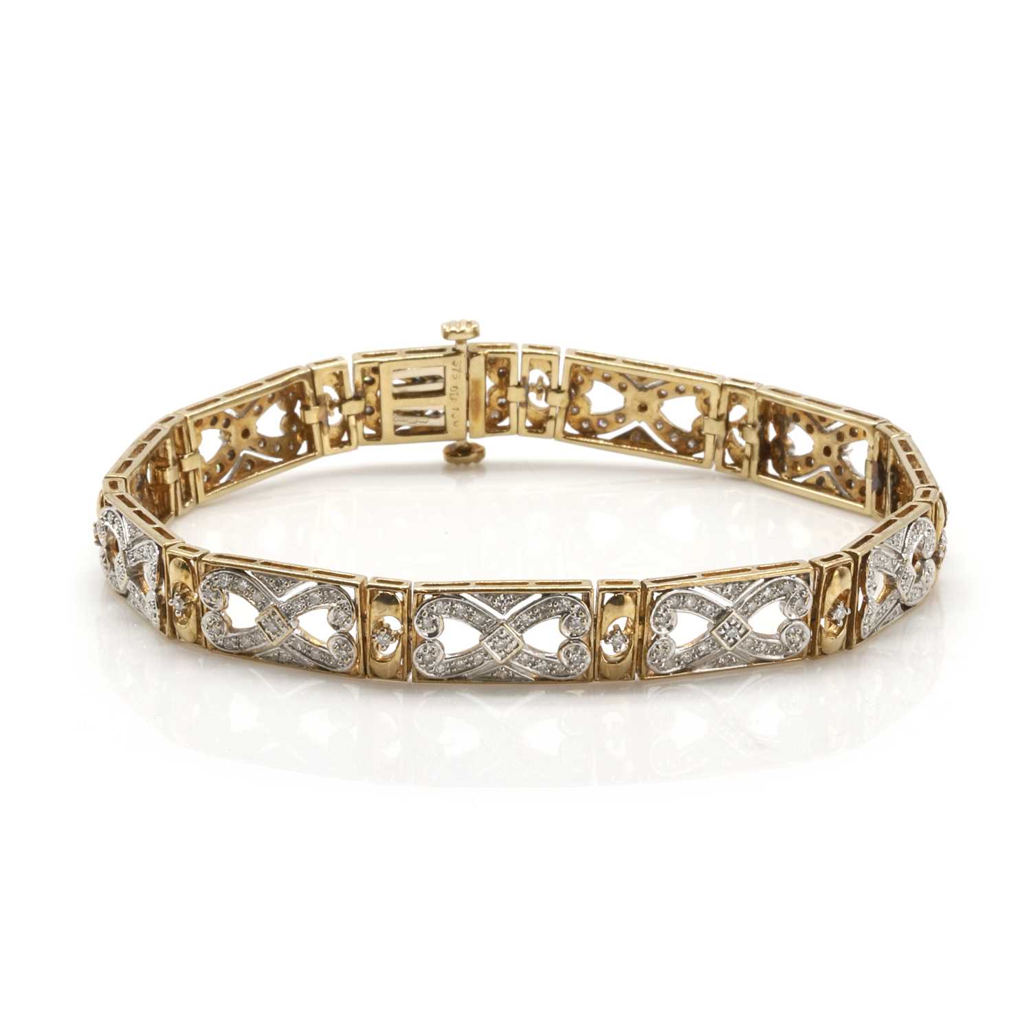 Lot 104 - A 9ct gold diamond set bracelet,