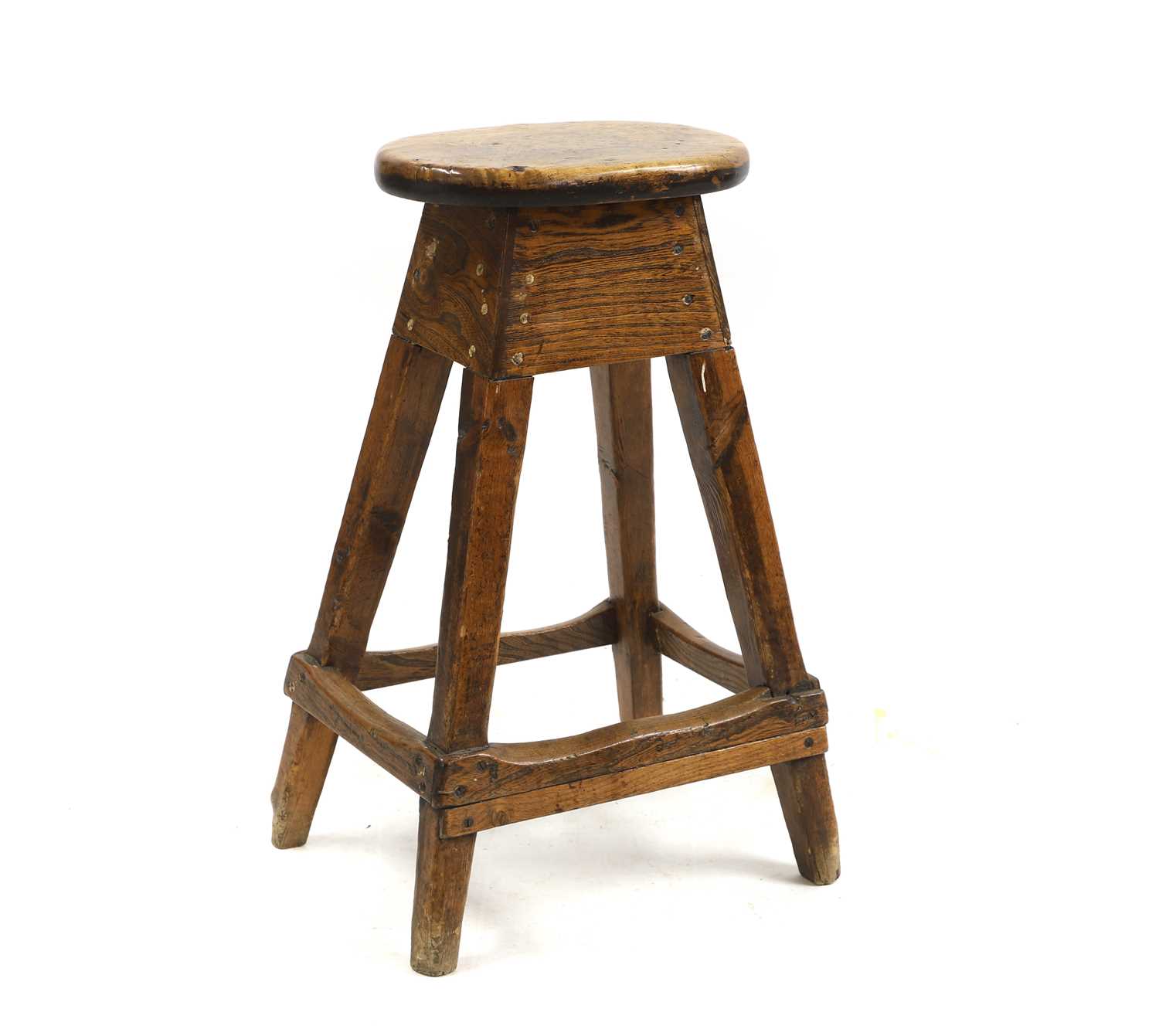 Lot 730 - An elm stool,