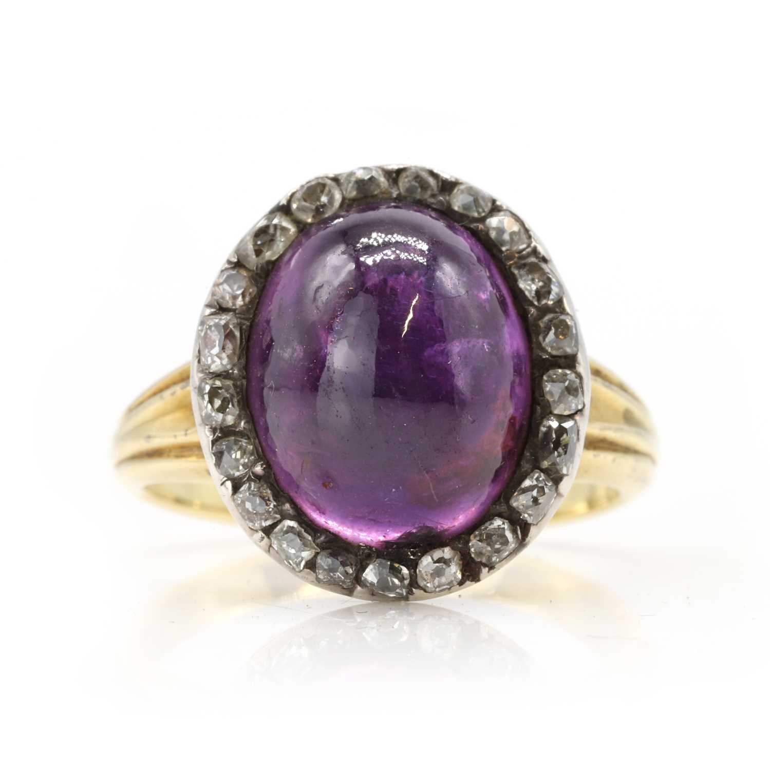 Lot 21 - An antique purple star sapphire and diamond