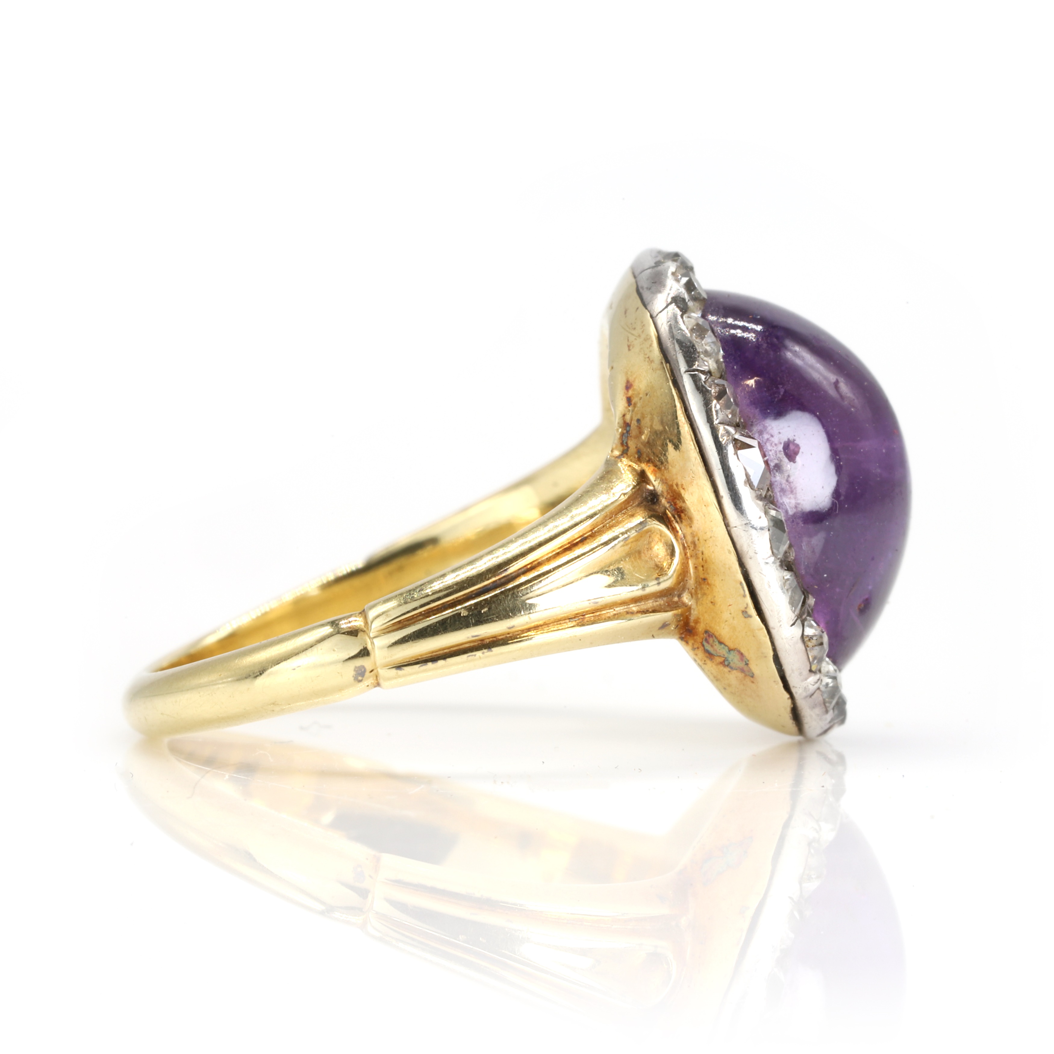 Lot 21 - An antique purple star sapphire and diamond