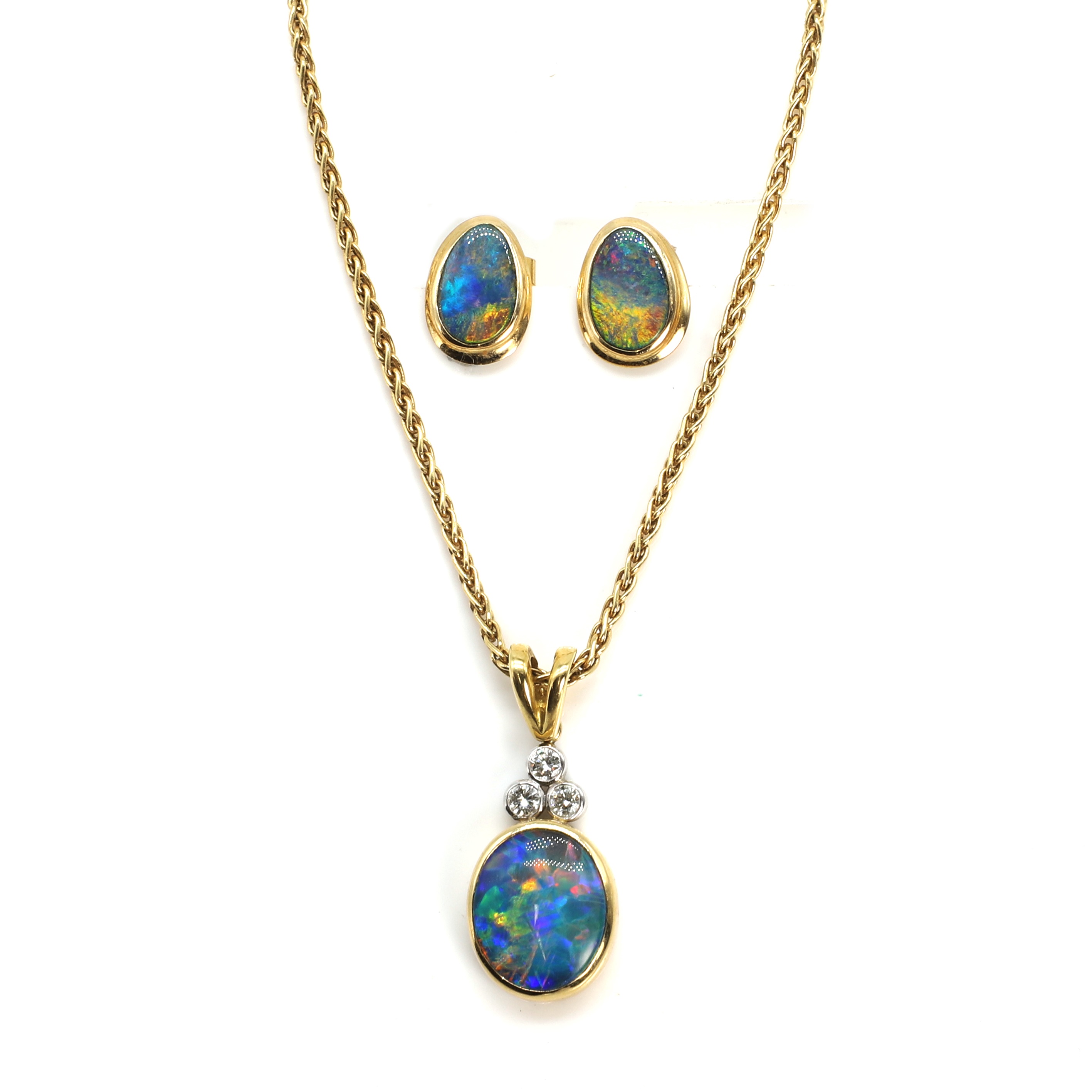 Lot 224 - An 18ct yellow and white gold black opal