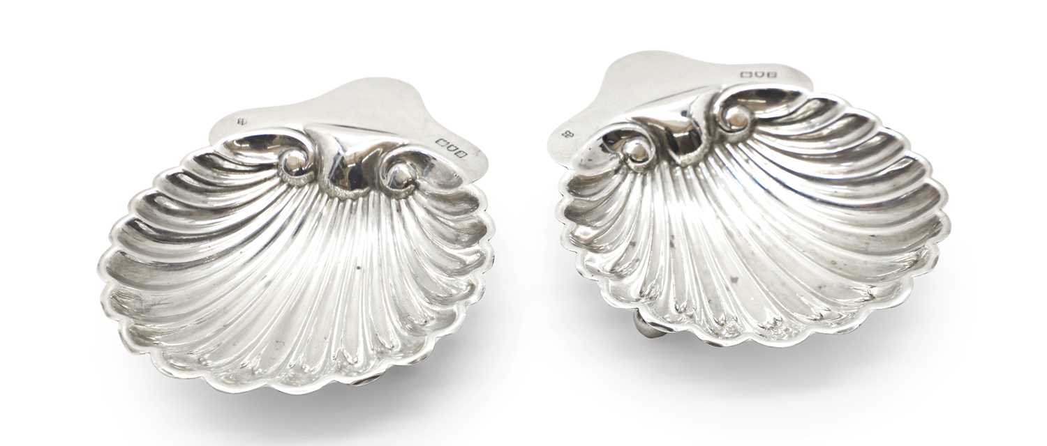 Lot 53 - A pair of shell butter dishes,