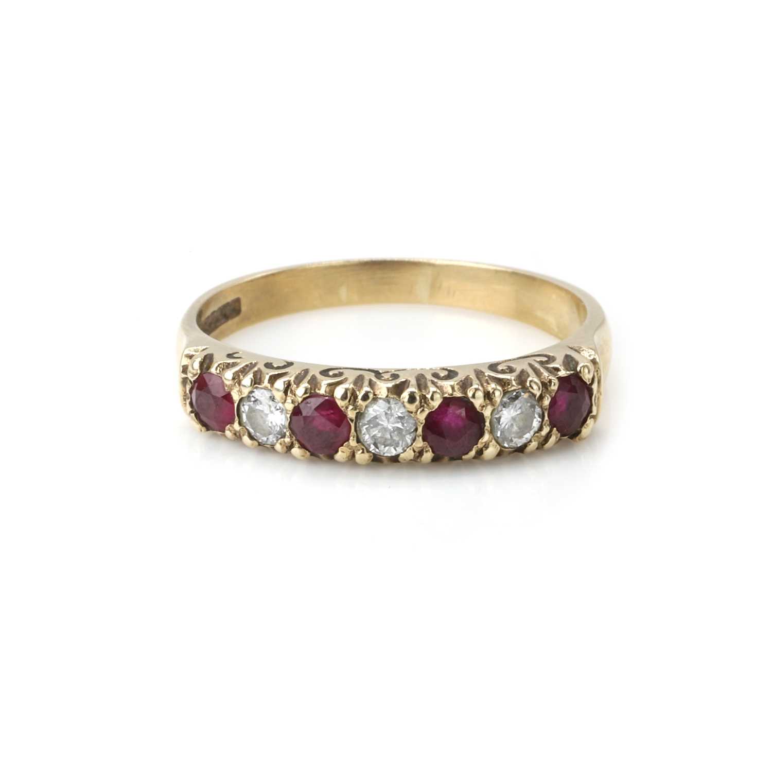 Lot 116 - A 9ct gold ruby and diamond seven stone ring,