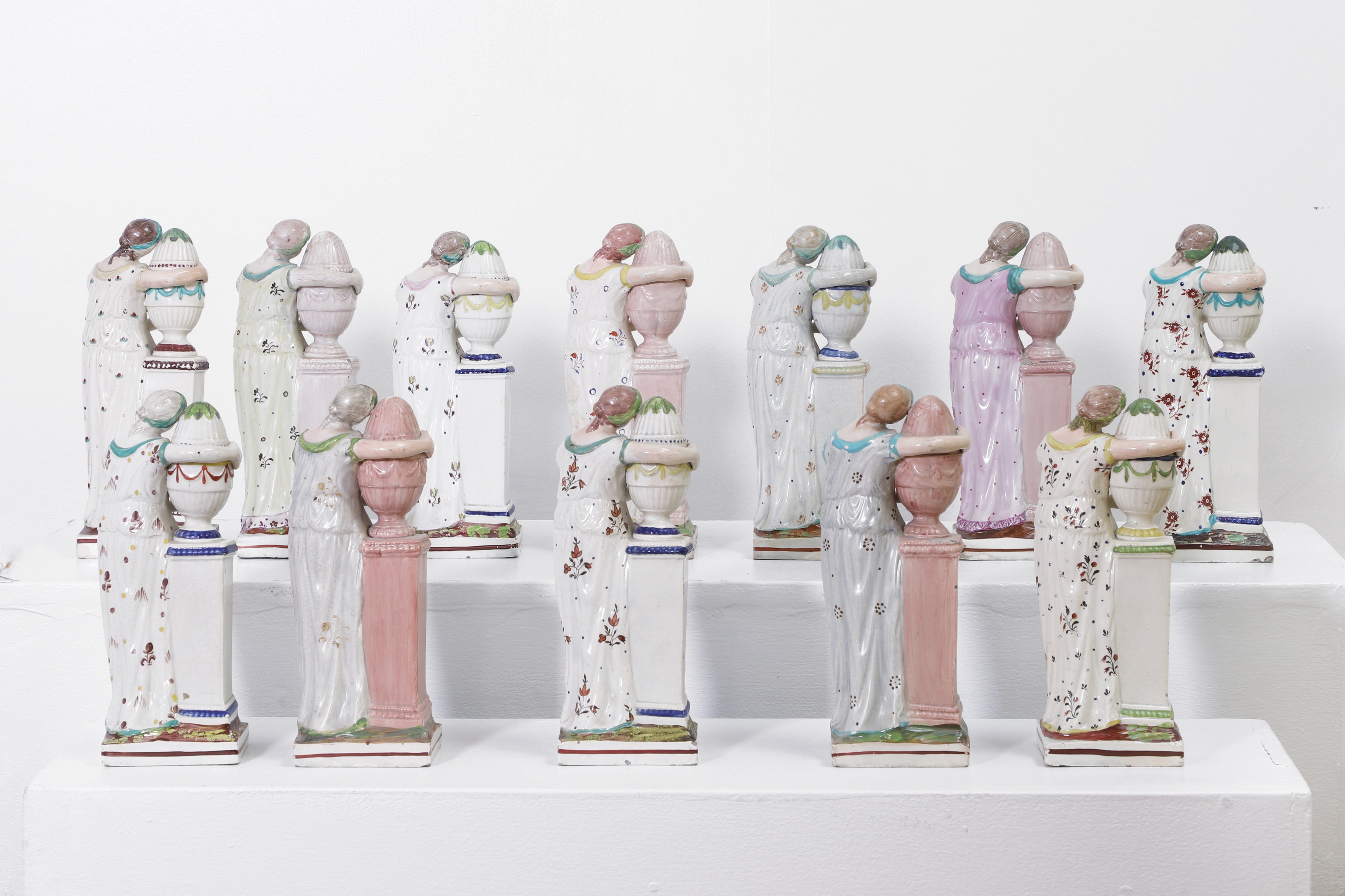 Lot 435 - A collection of pearlware figures,
