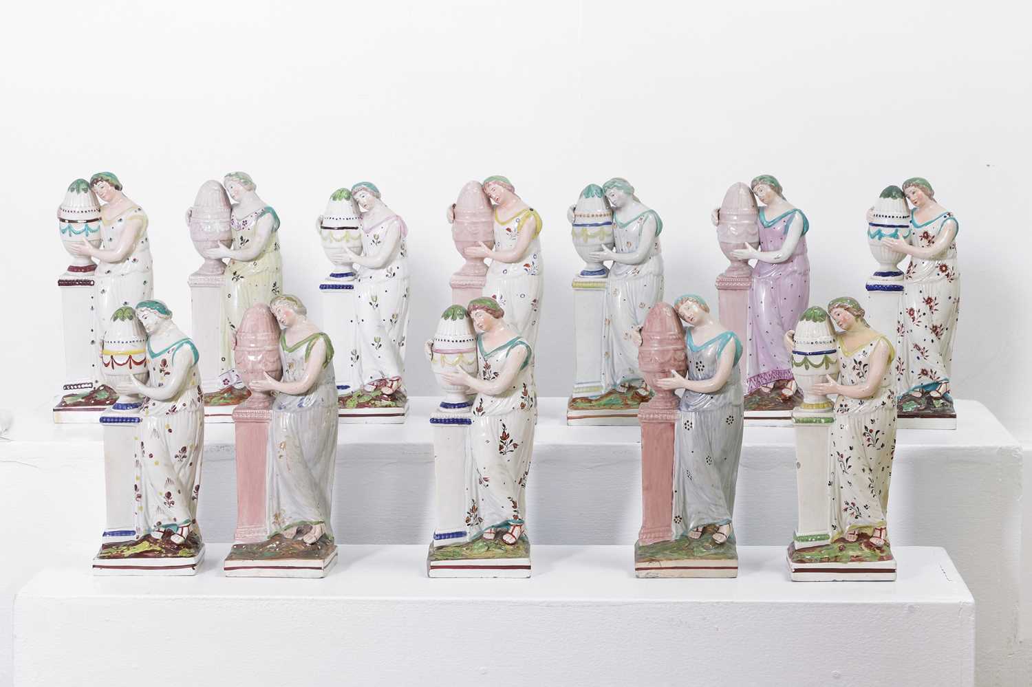 Lot 435 - A collection of pearlware figures,