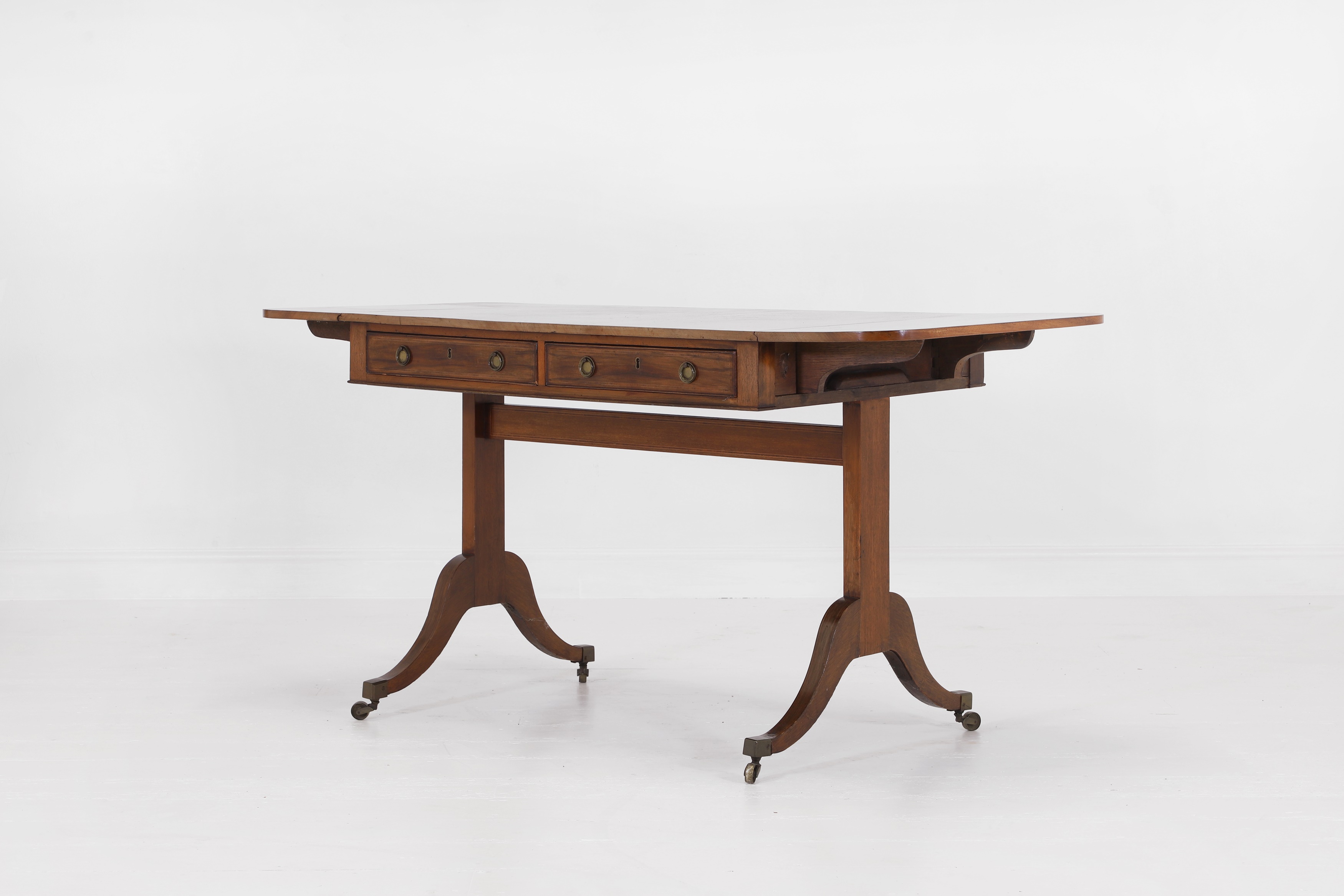 Lot 523 - A late George III mahogany sofa table,