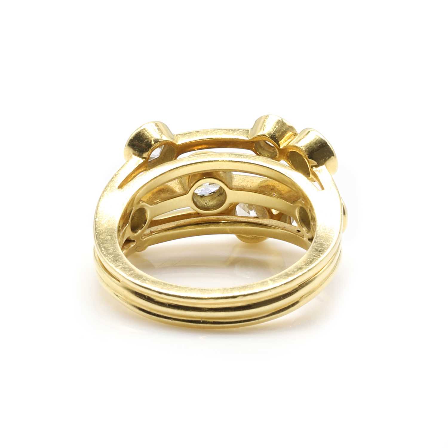 Lot 218 - An 18ct gold diamond Raindance ring, by