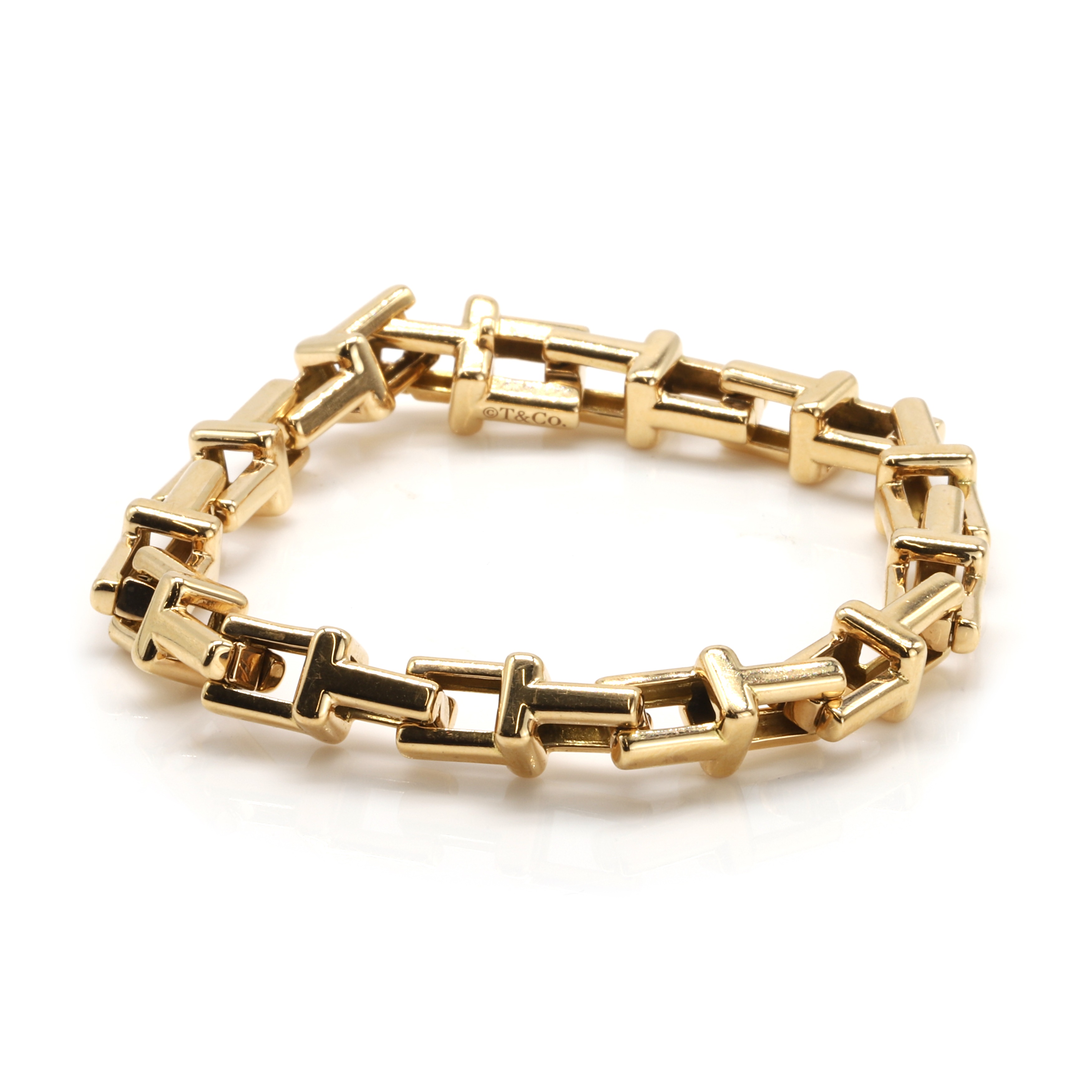 Lot 176 - An 18ct gold T chain bracelet, by Tiffany